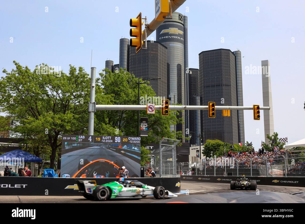 June 1st, 2025: Cars zoom by in the shadow of the GM RenCenter during ...