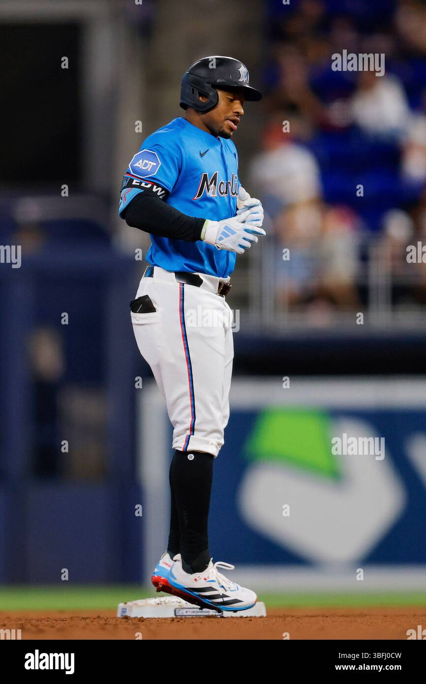 MIAMI, FL - JUNE 01: Xavier Edwards (9) of the Miami Marlins reaches ...