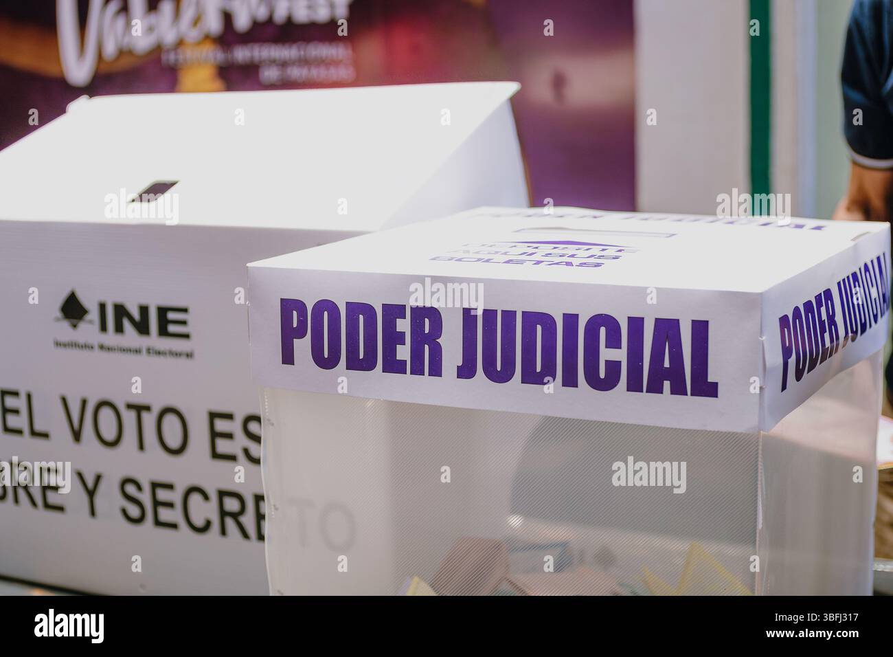 A transparent ballot box labeled “Poder Judicial” is displayed at a ...