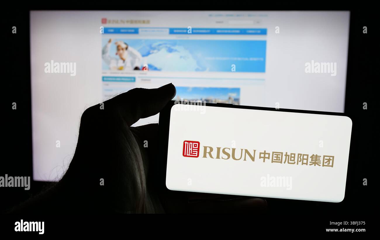 Germany. 14th May, 2025. In this photo illustration, a person is holding a mobile phone with the ...