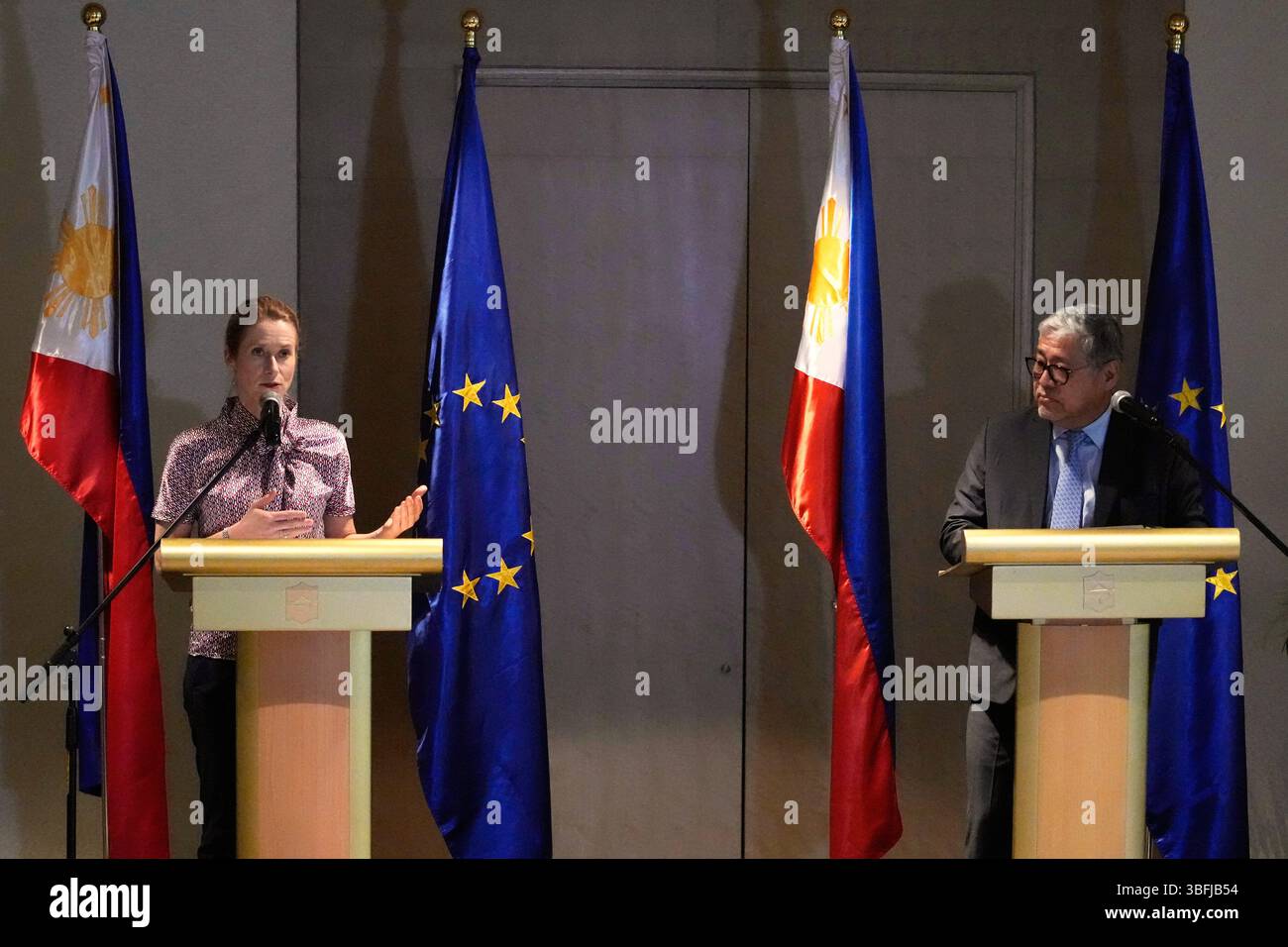 The European Union's foreign policy chief Kaja Kallas, left, talks ...