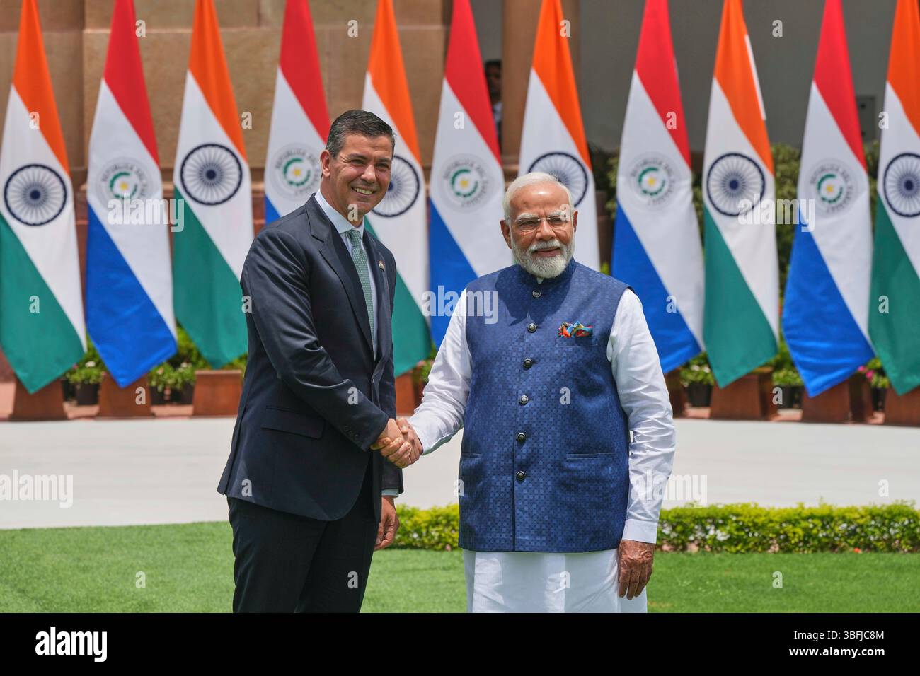 Indian Prime Minister Narendra Modi, right, welcomes Paraguay's ...