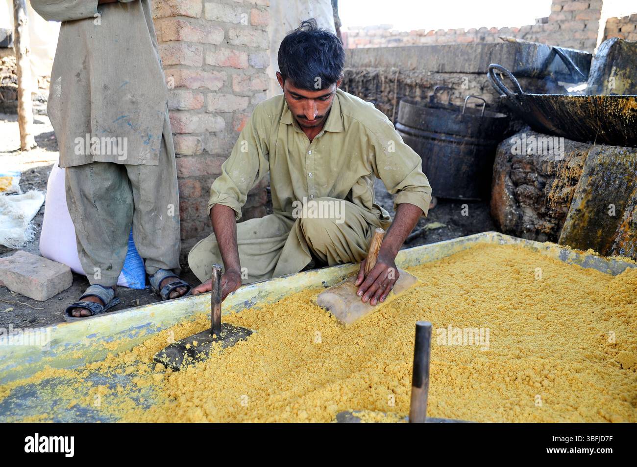A step in the production of cane sugar - Pakistan Stock Photo - Alamy