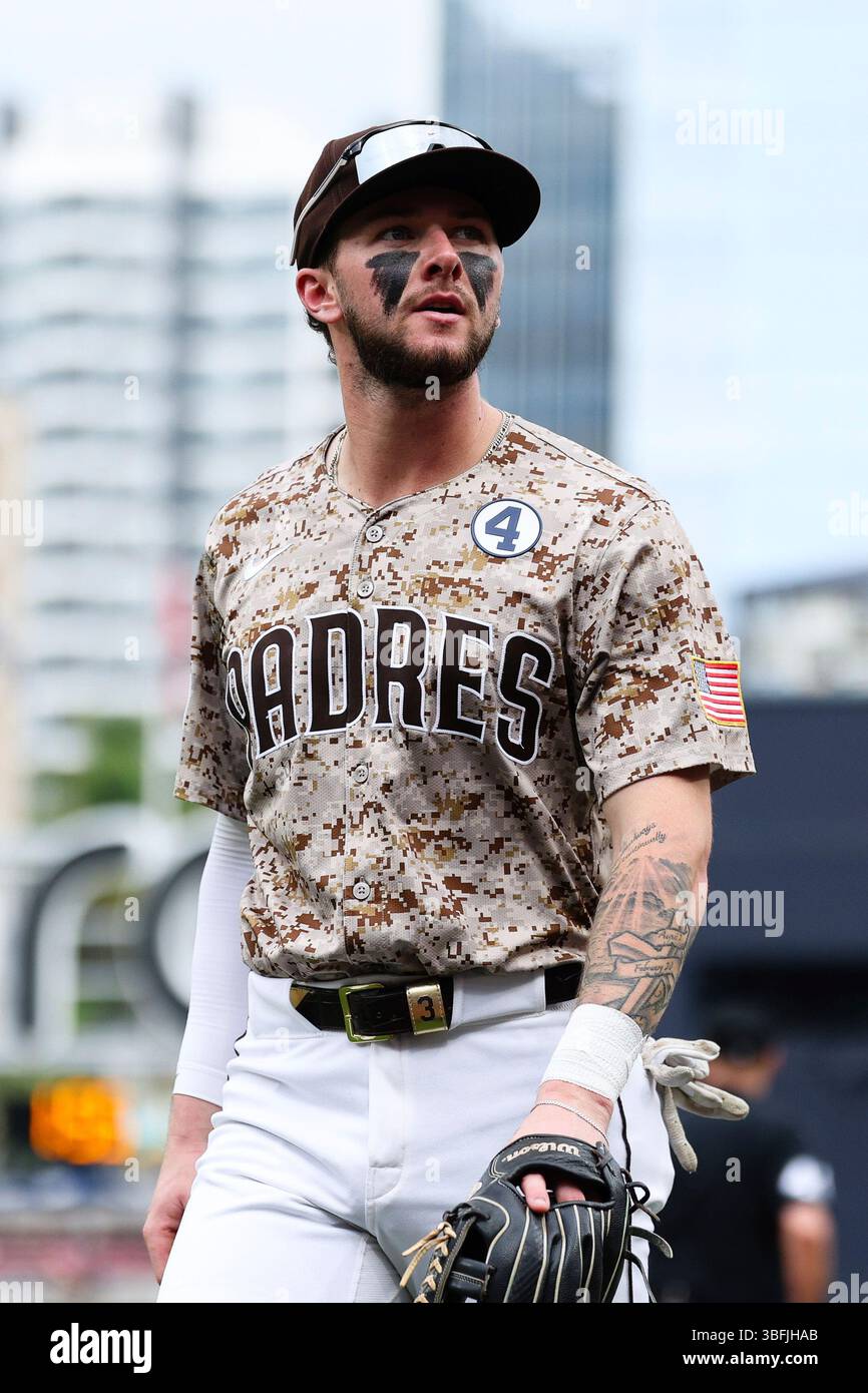 San Diego Padres' Jackson Merrill heads to the dugout during a baseball ...