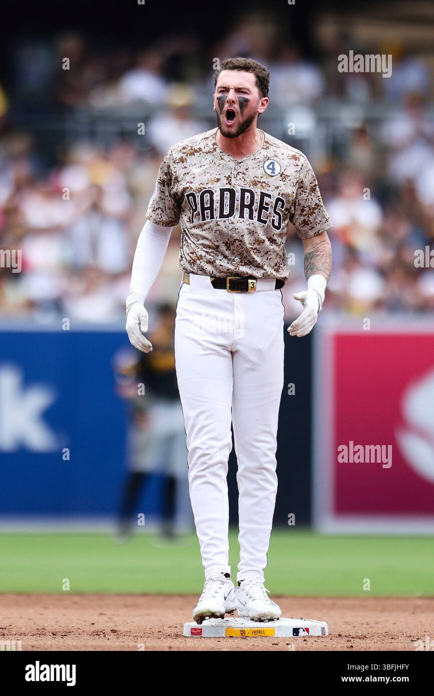 San Diego Padres' Jackson Merrill reacts after hitting an rbi double ...