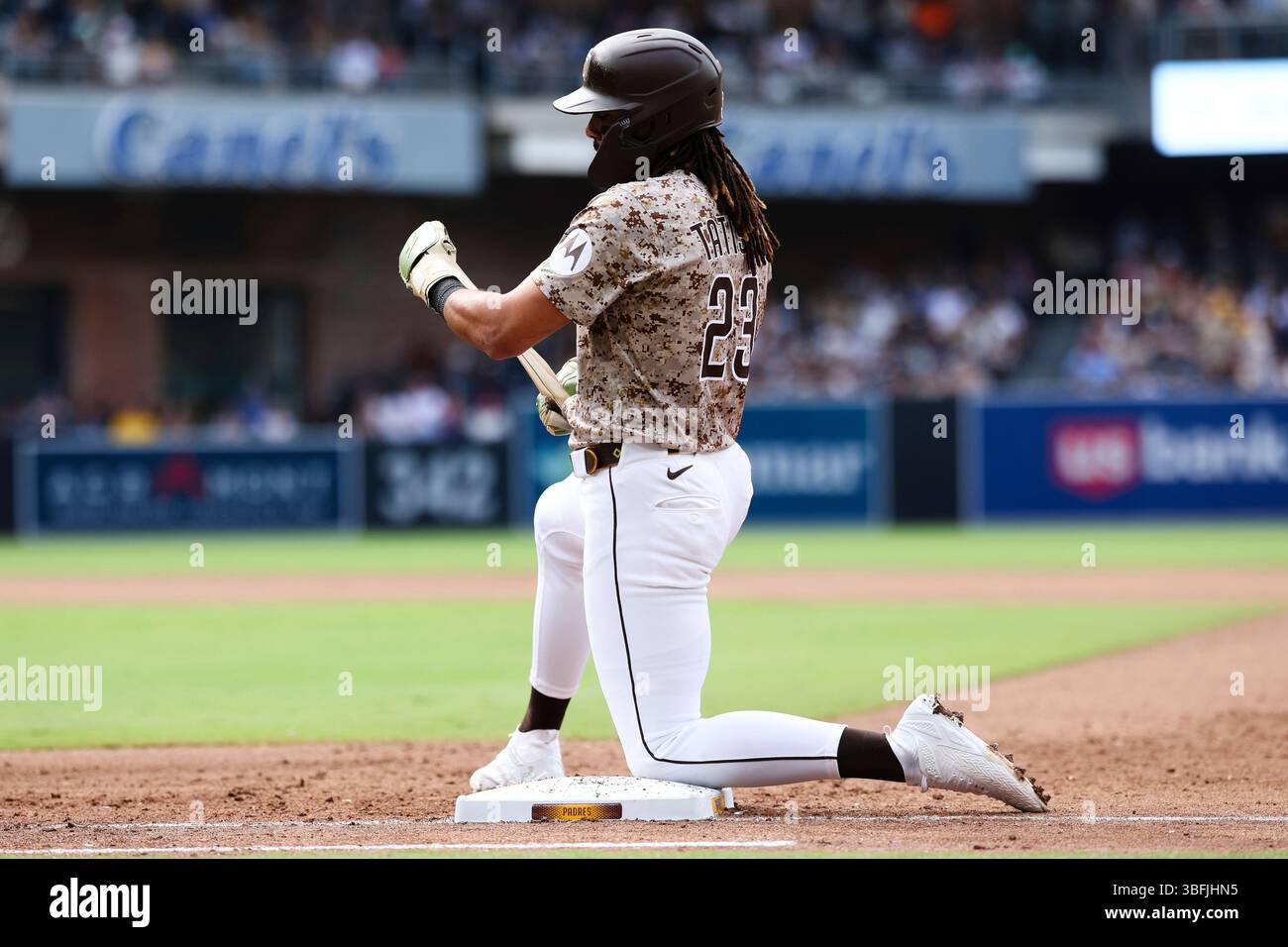 San Diego Padres' Fernando Tatis Jr. adjusts his equipment during a ...
