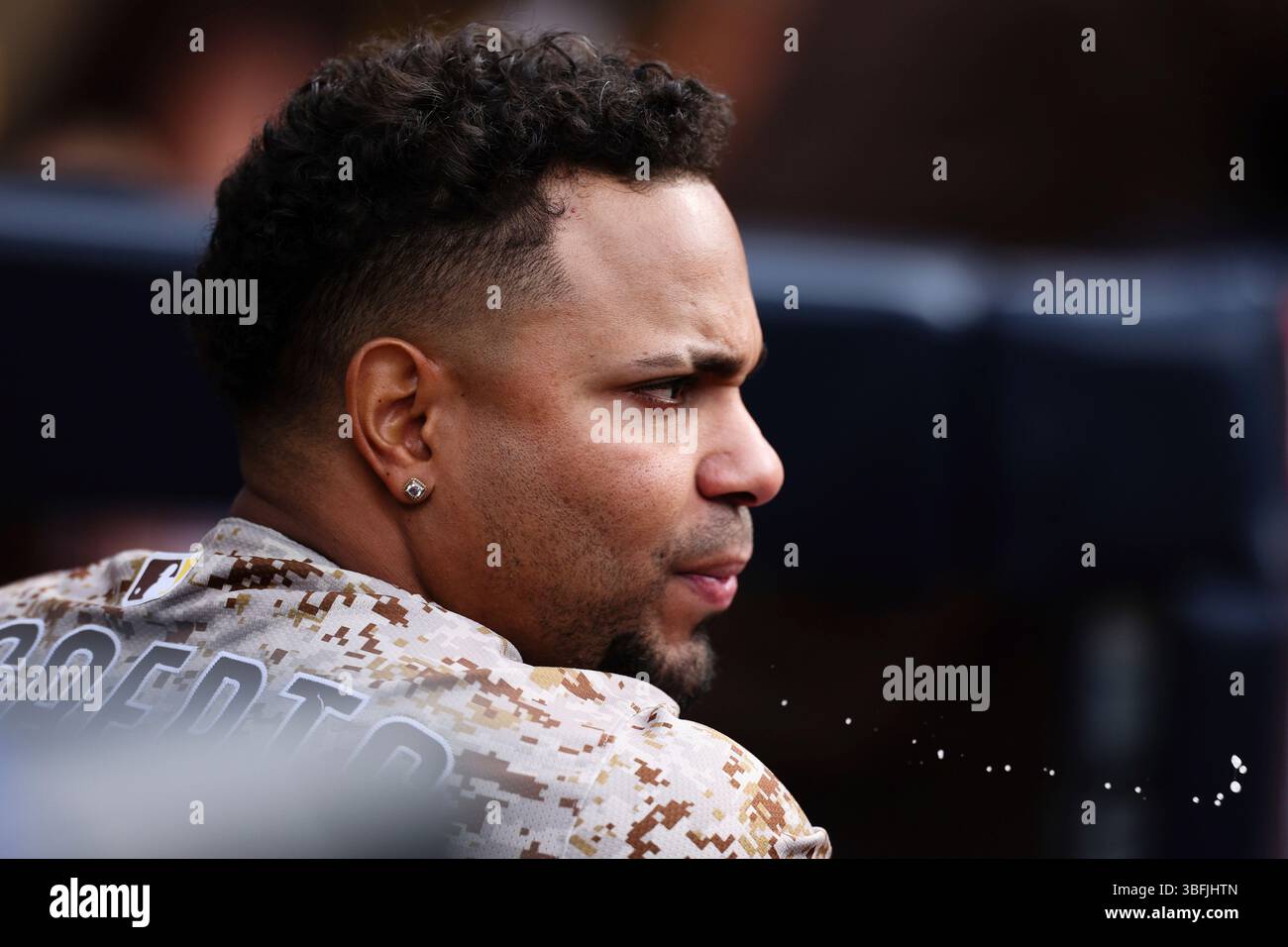 San Diego Padres' Xander Bogaerts looks on from the dugout during a ...