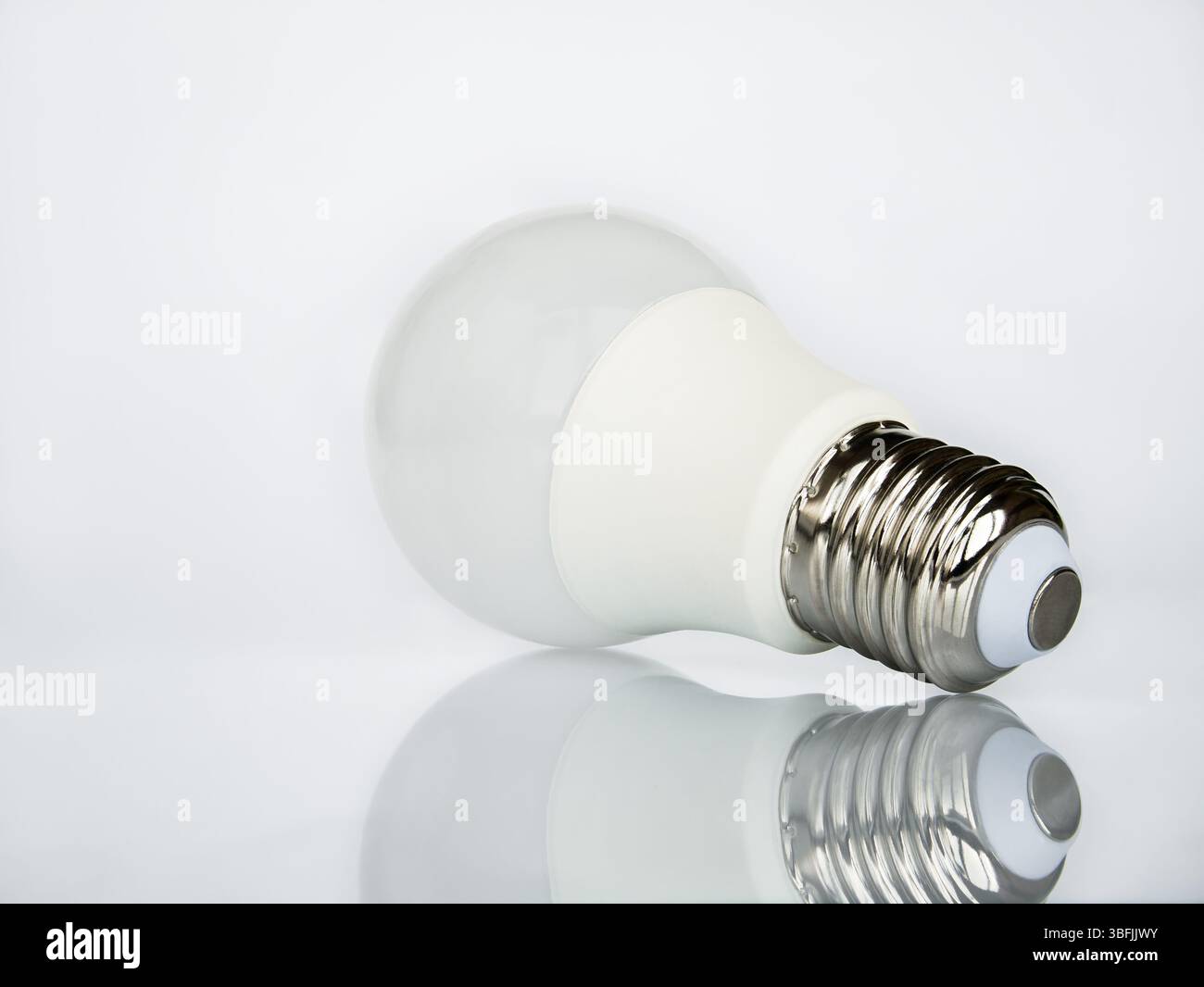 View from the base of the socket on an LED lamp isolated on a white ...