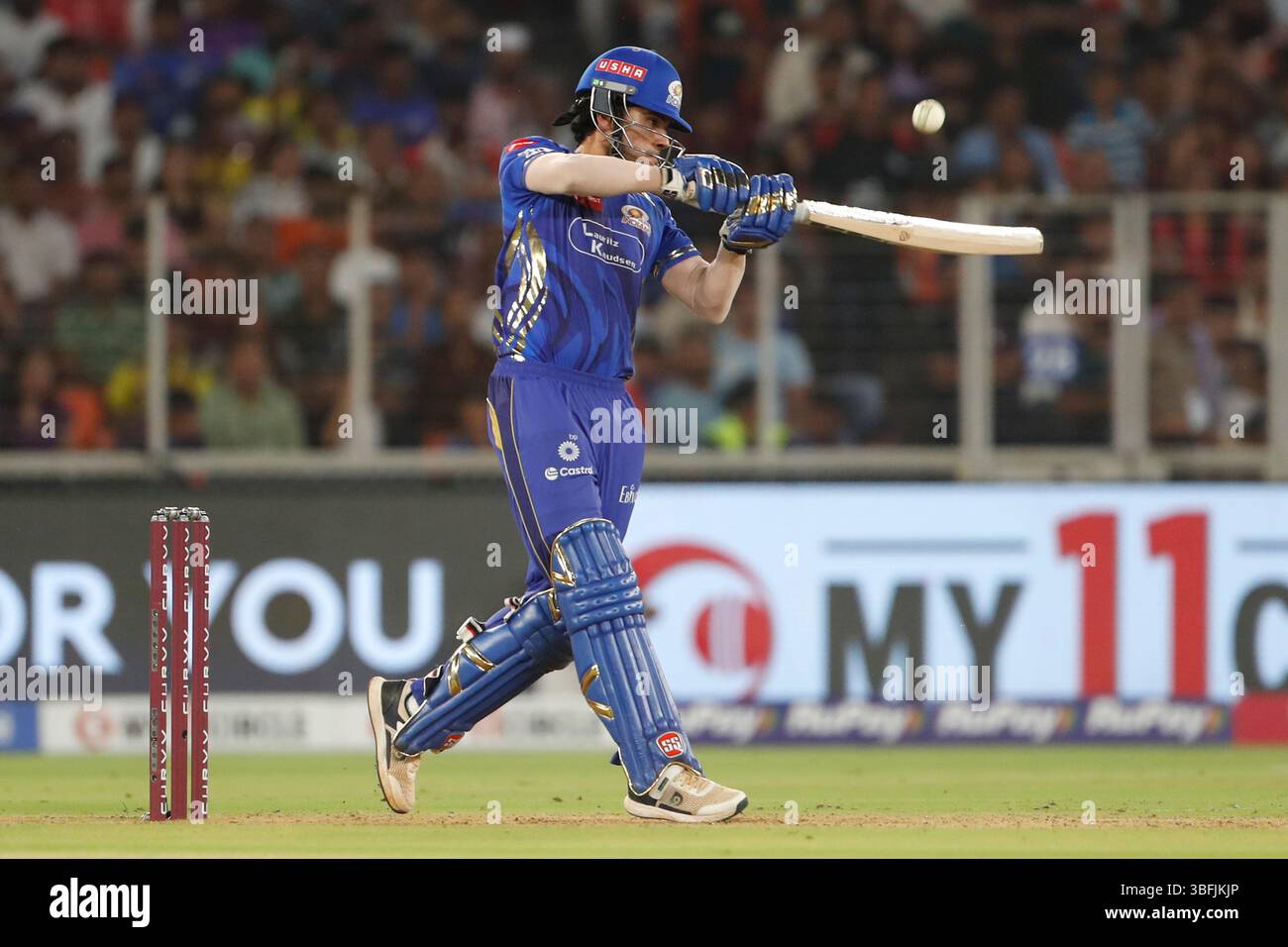 AHMEDABAD, INDIA - JUNE 1: Raj Angad Bawa of Mumbai Indians plays a ...