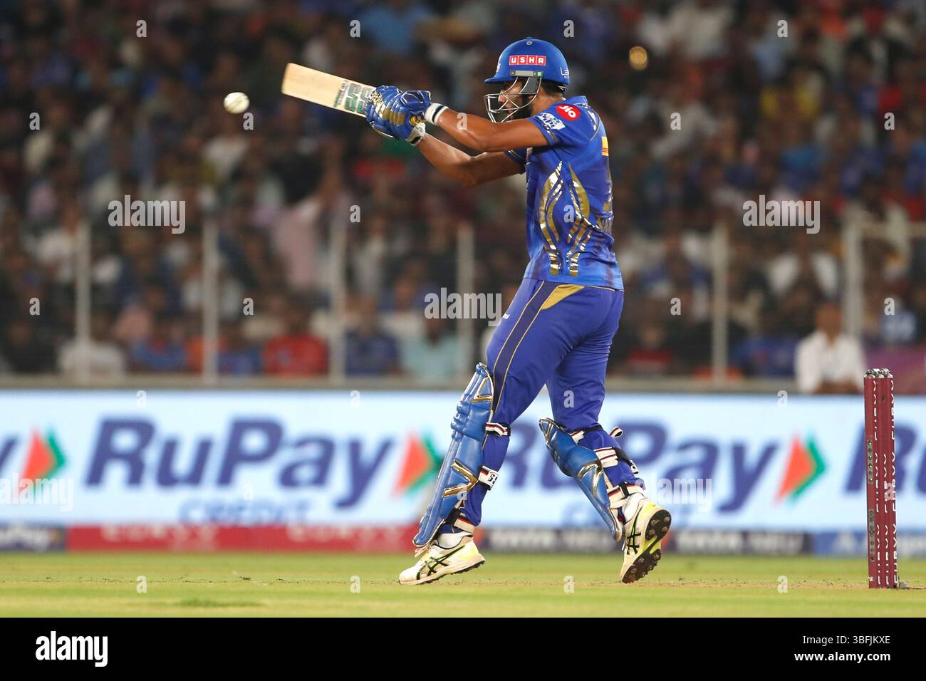 AHMEDABAD, INDIA - JUNE 1: Naman Dhir of Mumbai Indians plays a shot ...