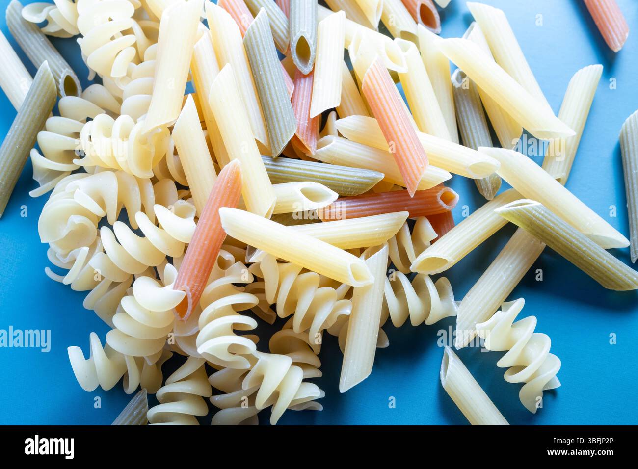 unmilled colorful pasta varieties, dry pasta, uncooked Stock Photo - Alamy