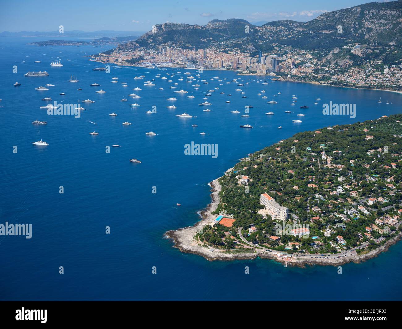 AERIAL VIEW. Many megayachts anchored in the Bay of Roquebrune on the ...