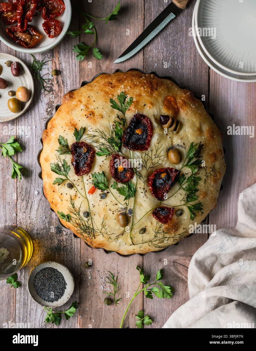 Top view baked focaccia bread decorated with flower design Stock Photo ...