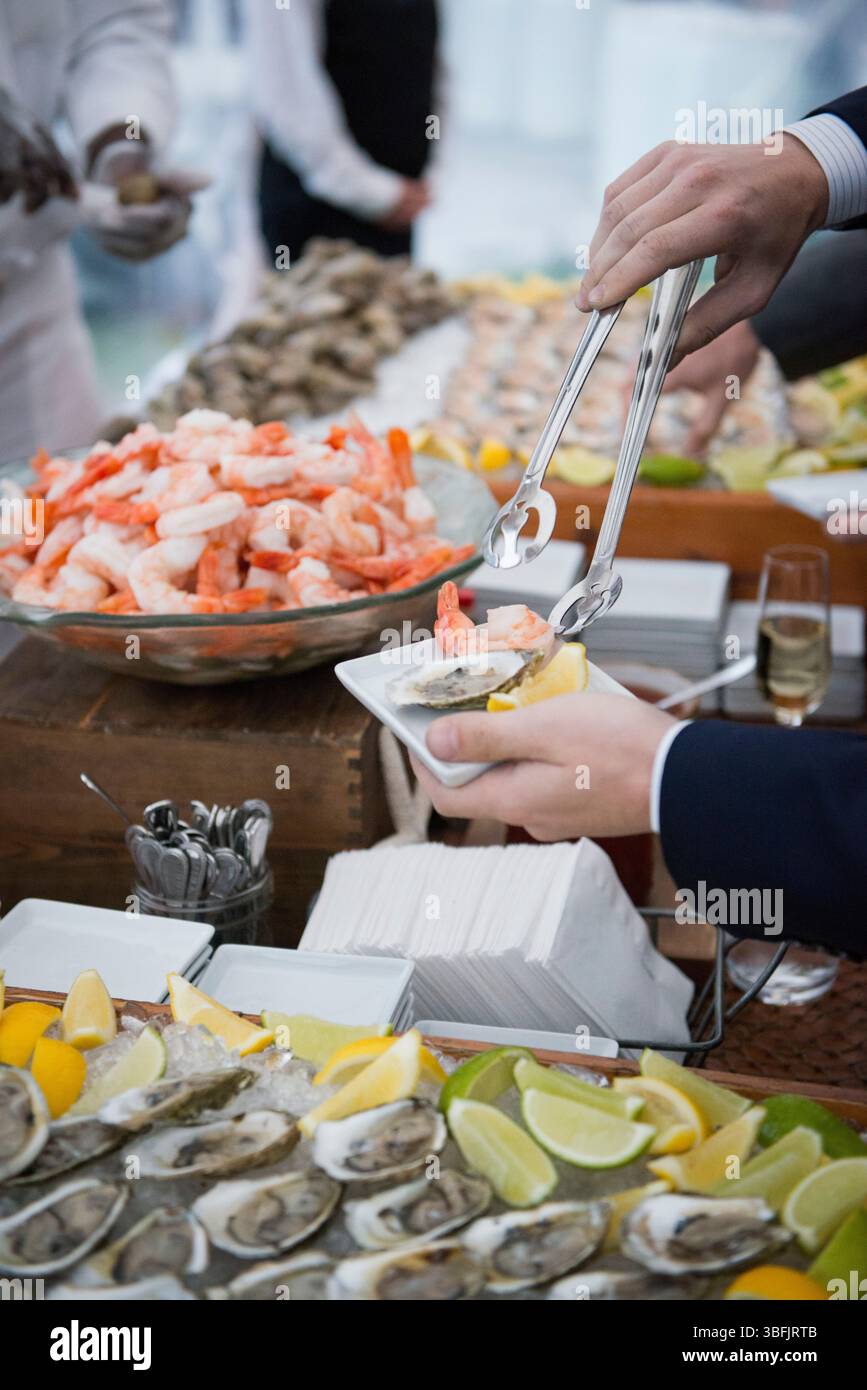 Elegant Seafood Bar with Shrimp, Oysters, and Citrus Garnishes Stock ...