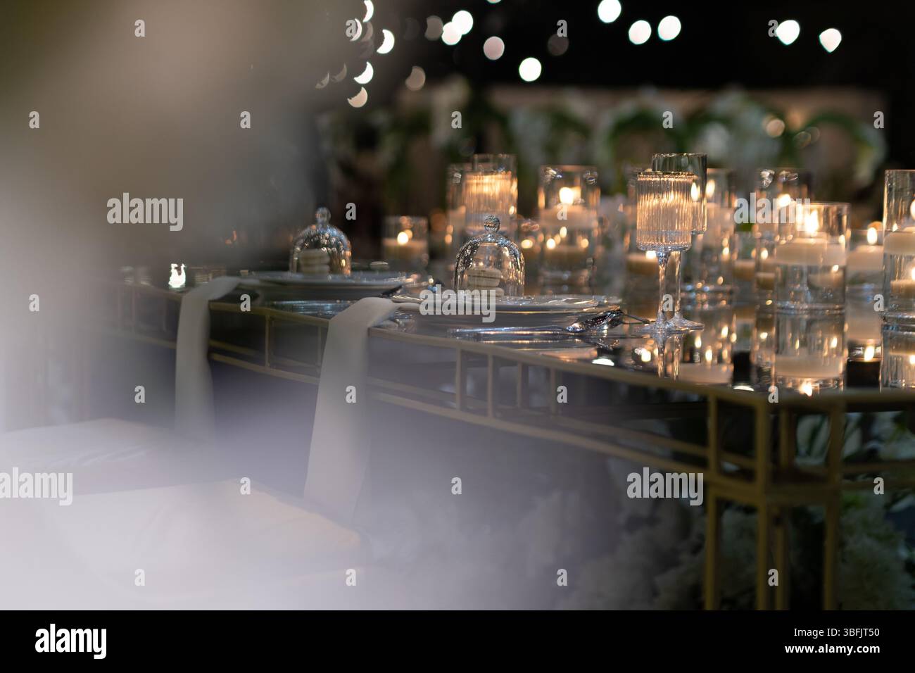 Beautiful Candlelit table setting at wedding reception Stock Photo - Alamy