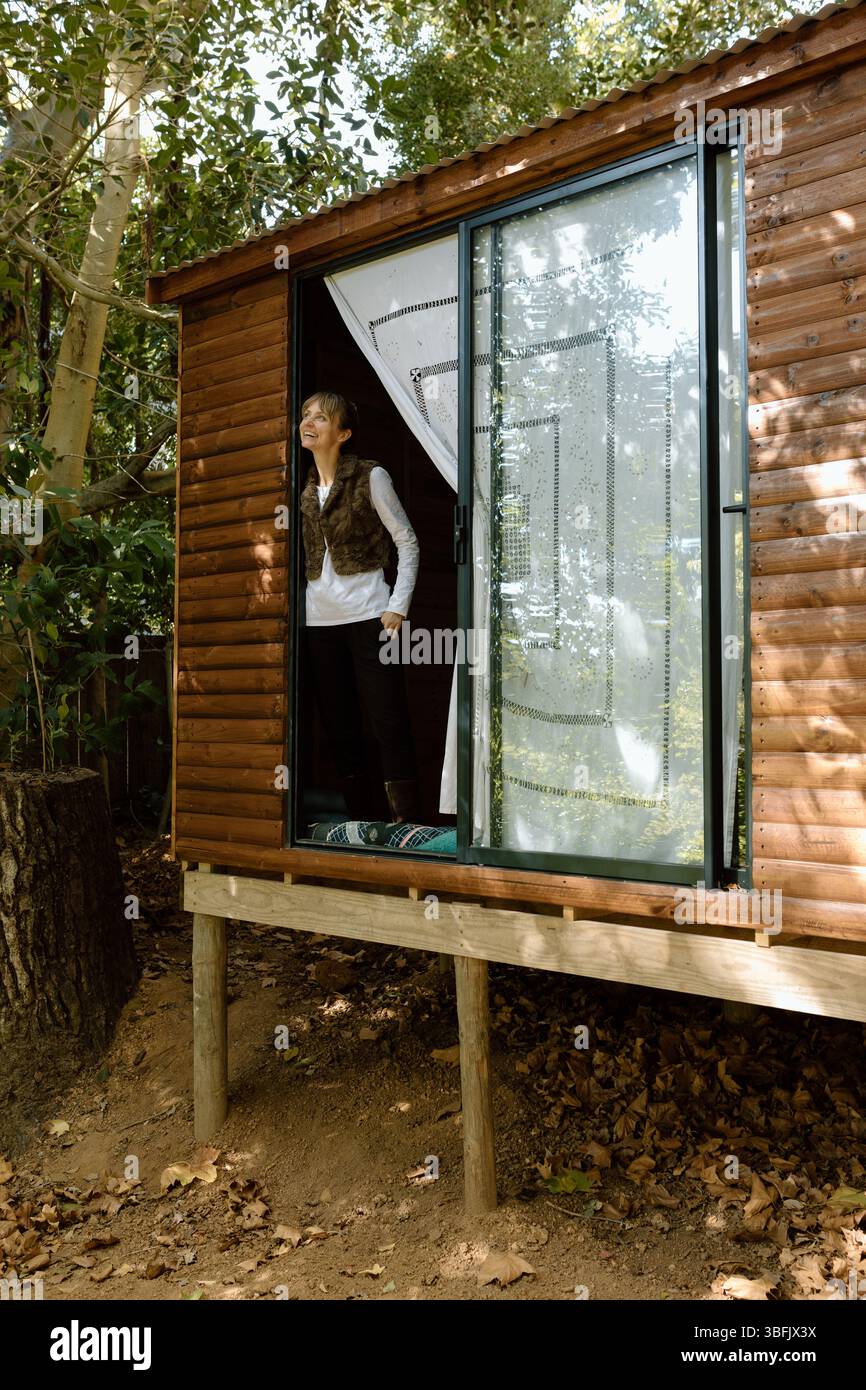 Woman in her tiny home build project Stock Photo - Alamy