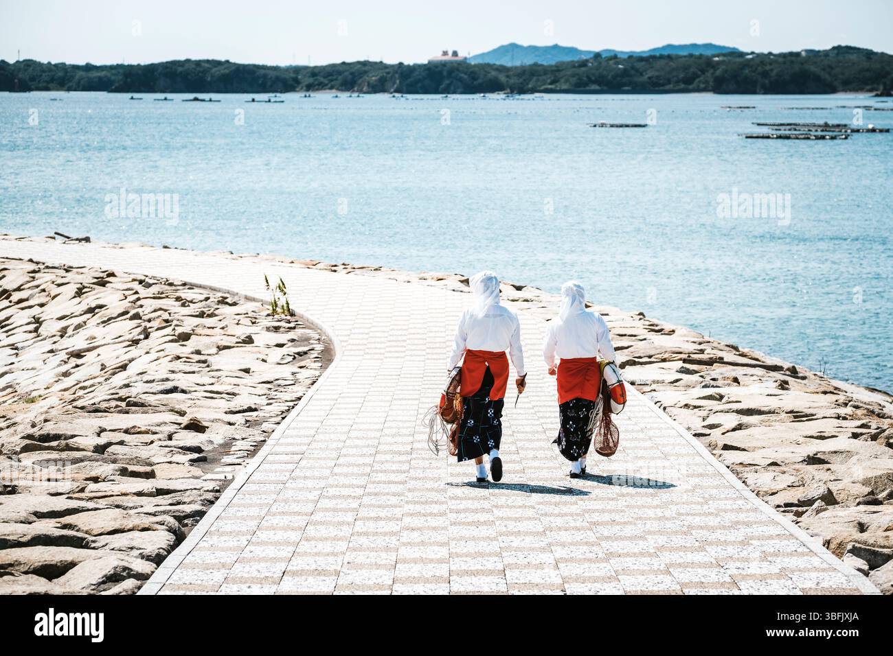 Japanese Ama divers wearing traditional attire near ocean Stock Photo ...