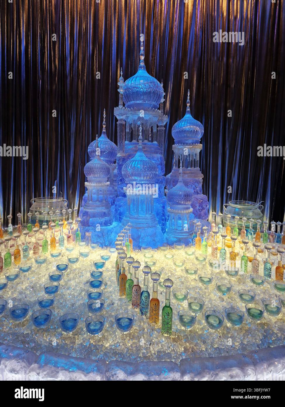 Intricately Lit Ice Structure with Glass Bottles and a Creative Display ...