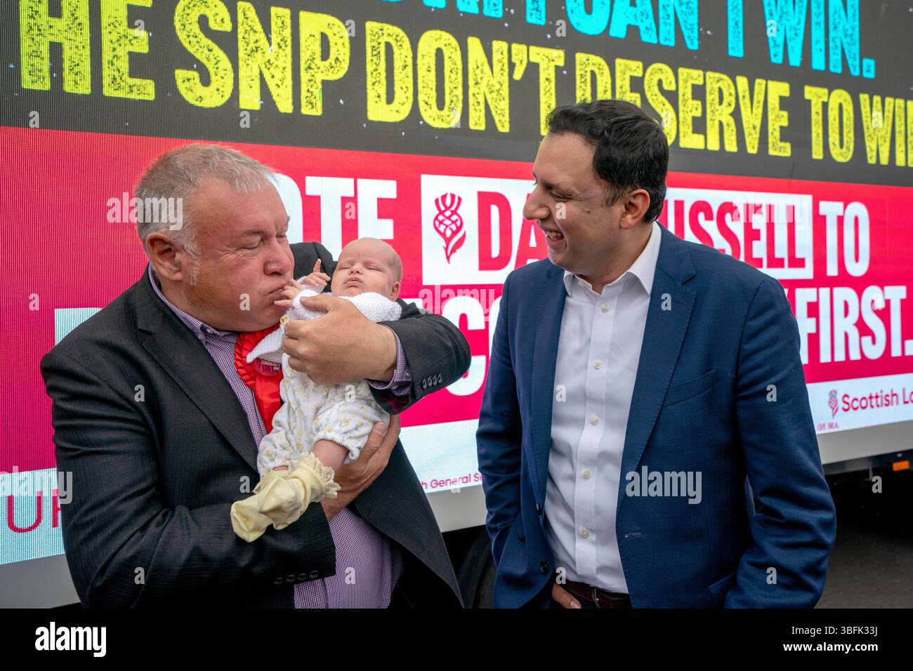 Scottish Labour leader Anas Sarwar (right) and candidate Davy Russell ...
