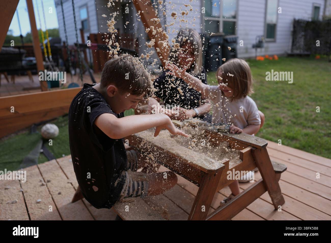 Eileen Lamb, center, who was diagnosed with autism as an adult, works ...