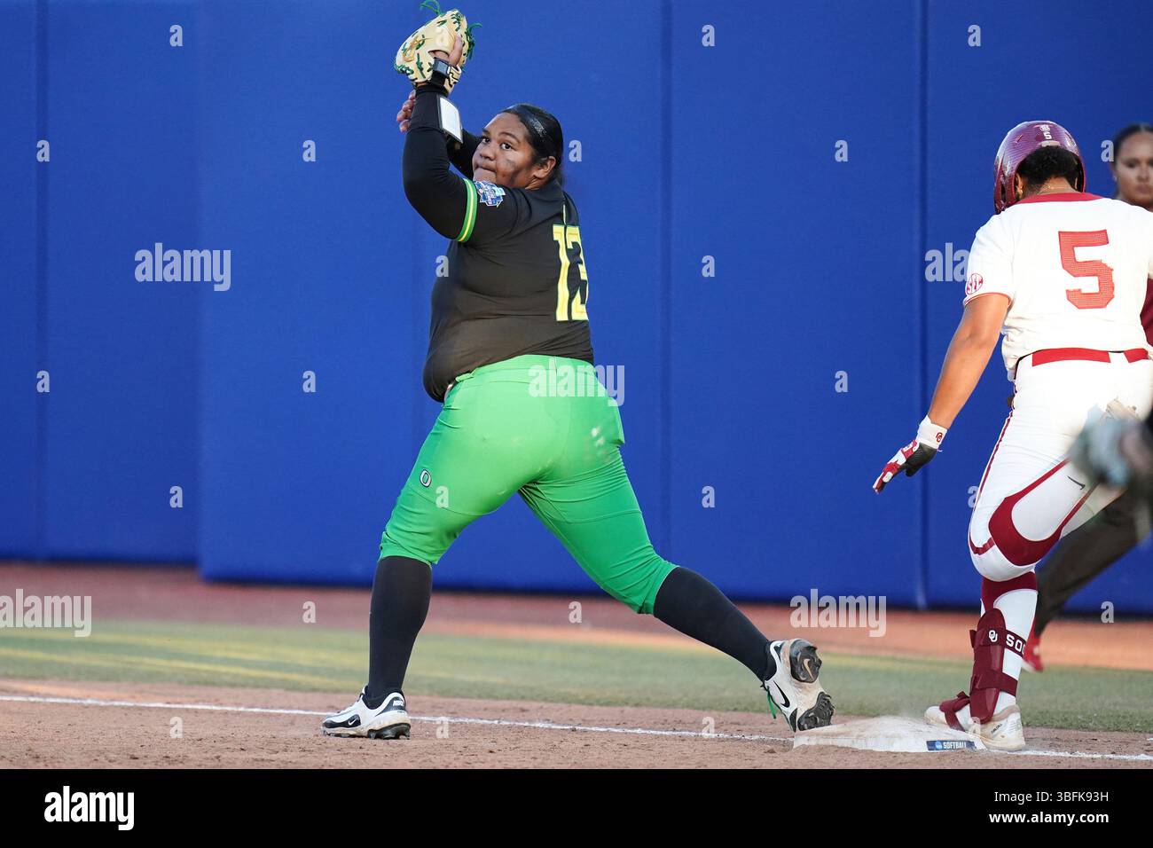 Oregon infielder Stefini Ma'ake (13) gets Oklahoma infielder Ella ...