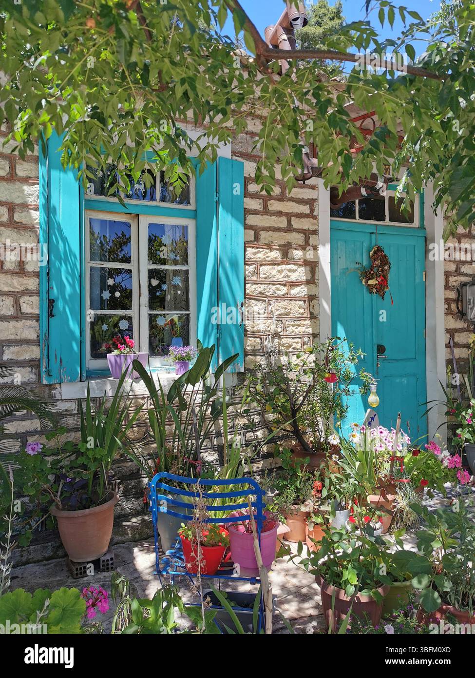Colourful traditional house in Vlicho (Vlycho) coastal village near ...