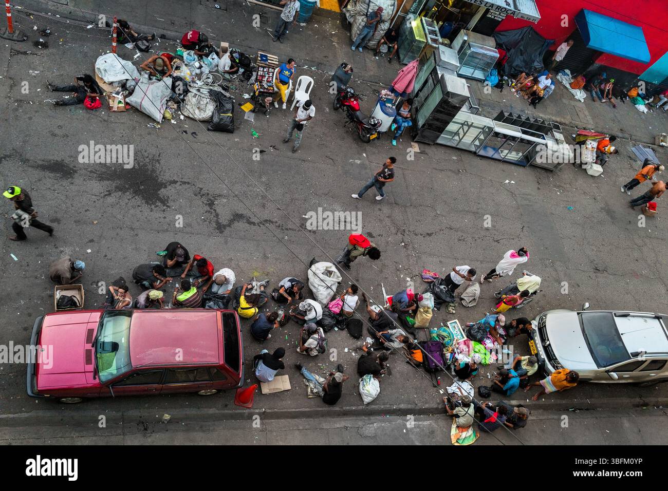 Dozens of Colombian drug users hang out and smoke basuco — an unrefined ...