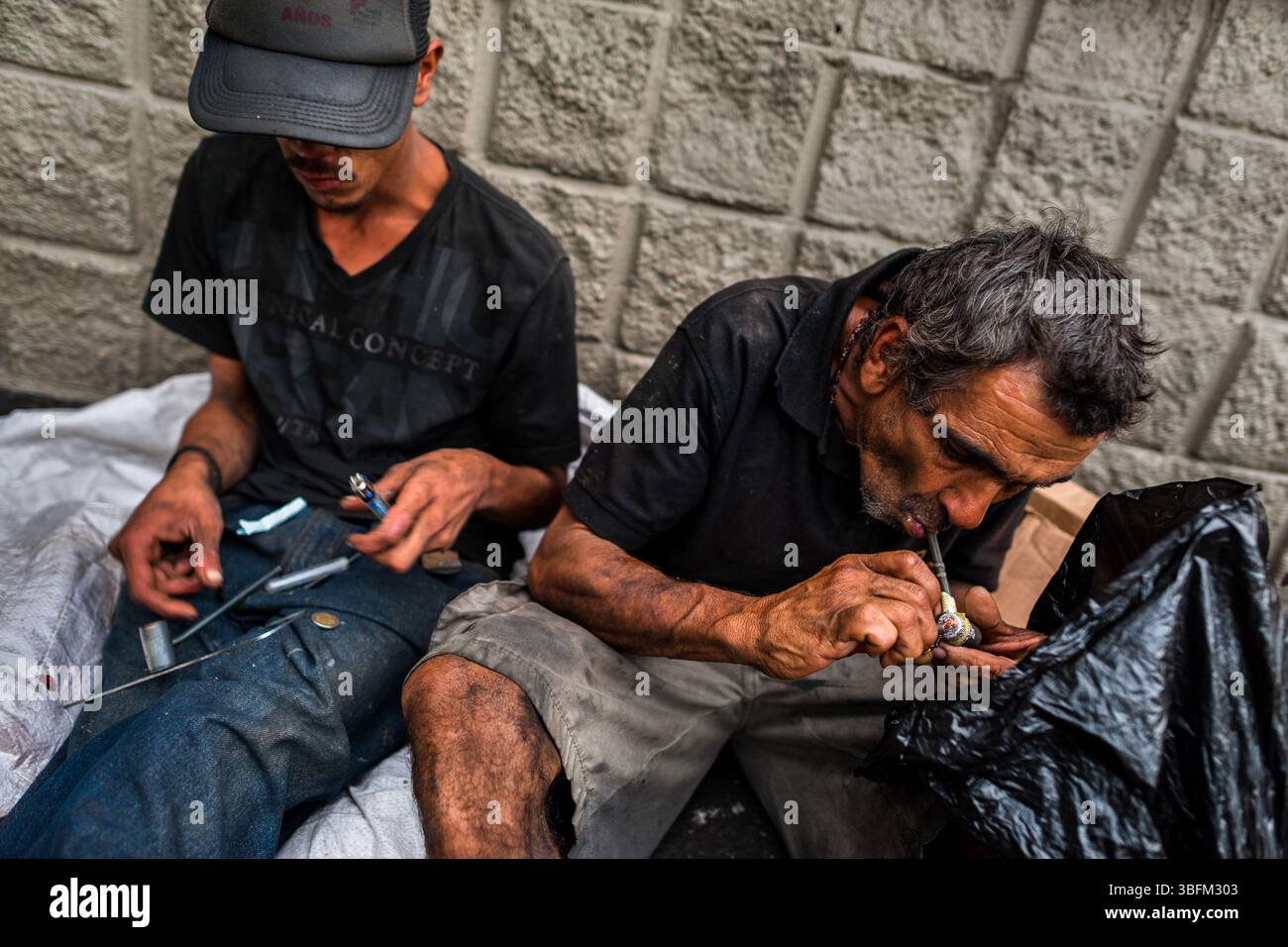 Colombian drug users smoke basuco – an unrefined, dirty cocaine paste ...