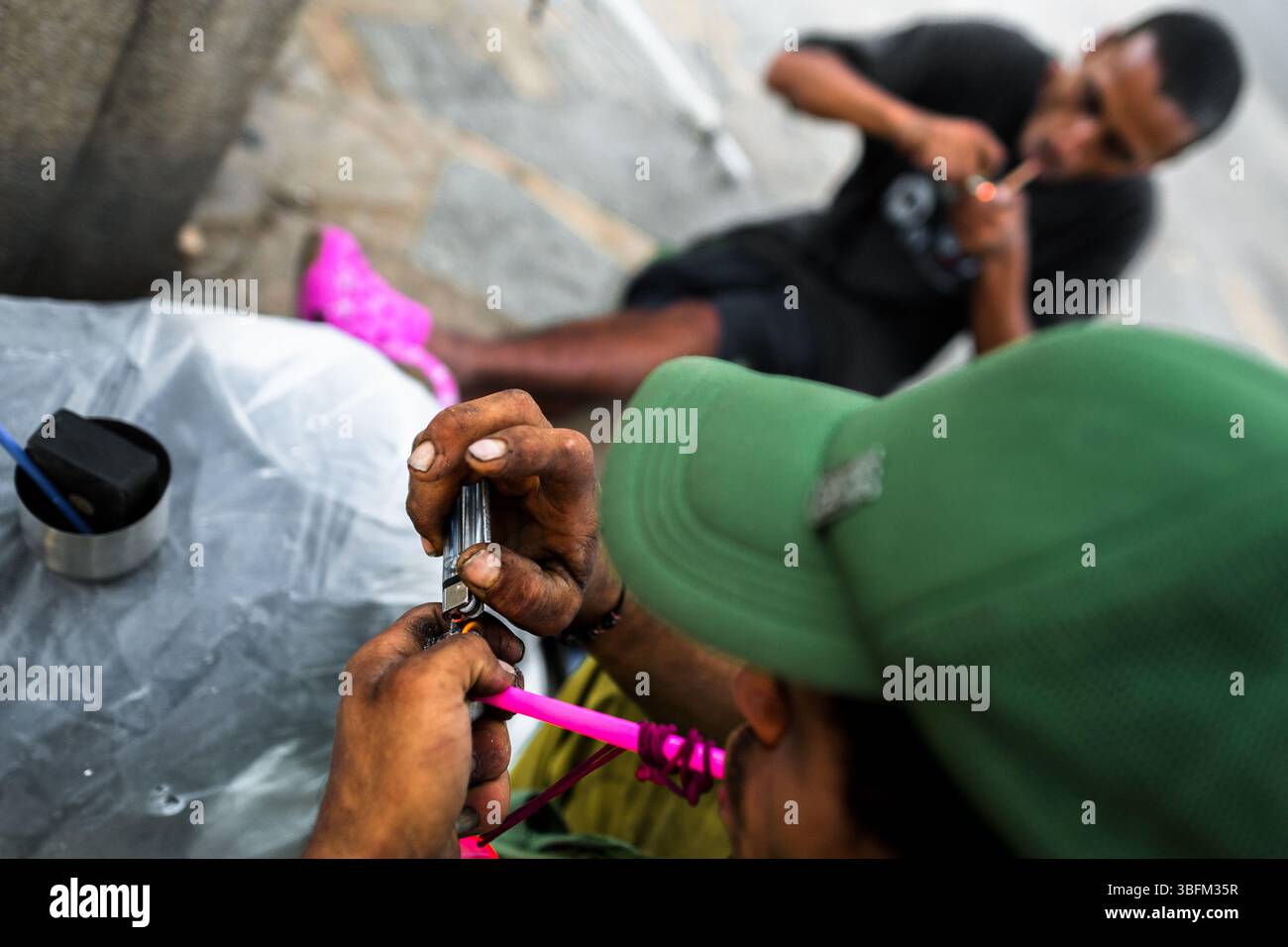 Colombian drug users smoke basuco – an unrefined, dirty cocaine paste ...