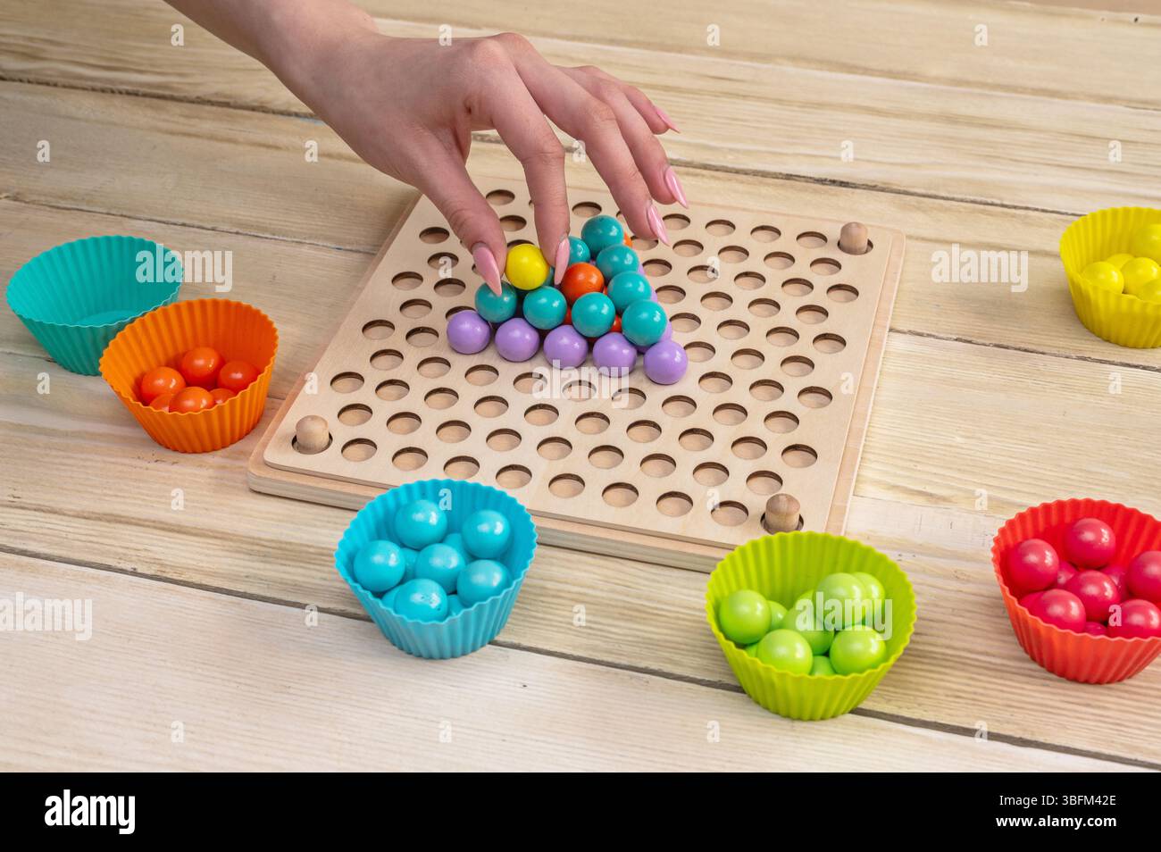 a children's game that develops fine motor skills and logical thinking ...