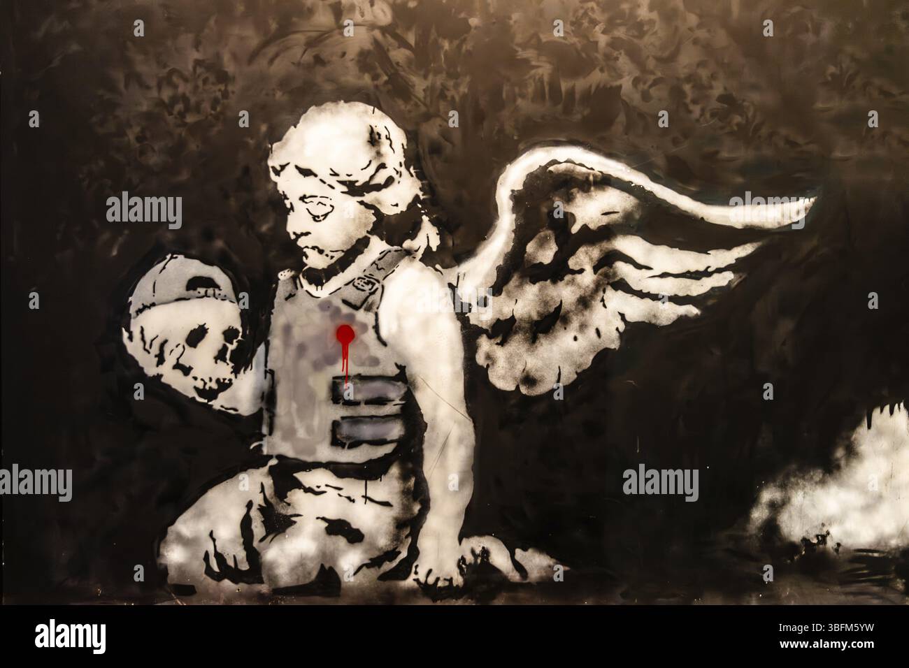 Banksy - Ozone's Angel, Angel with bulletproof vest as a symbol of loss ...