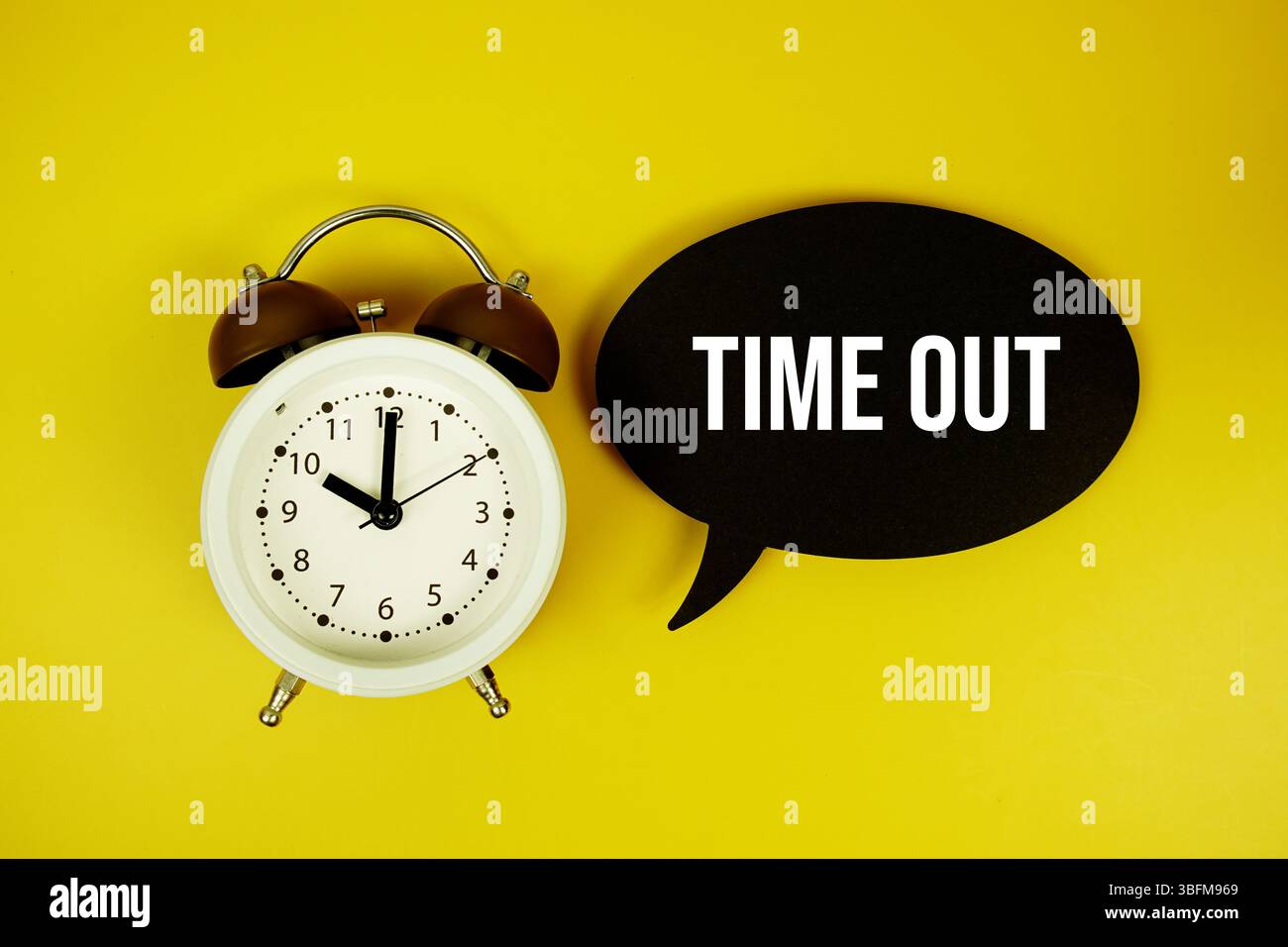 Time Out text text on speech bubble top view on yellow background Stock ...
