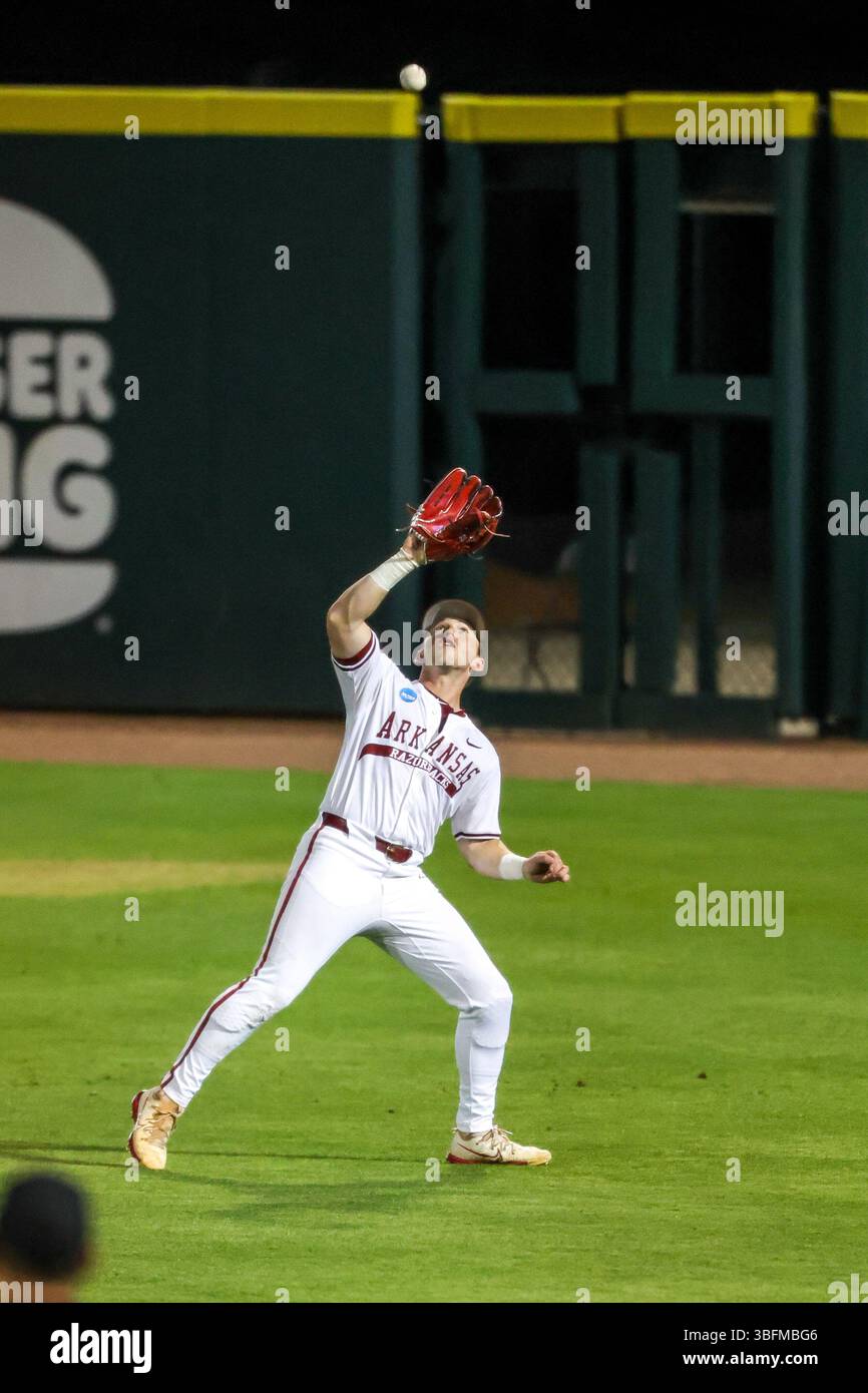 June 1, 2025: Arkansas left fielder Logan Maxwell (22) moves over under ...