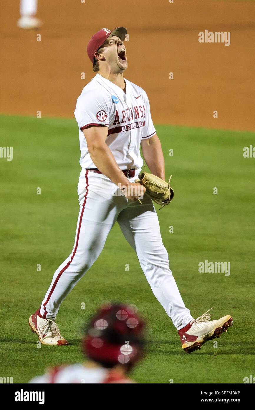 June 1, 2025: Arkansas pitcher Gage Wood (14) clinches his fist and ...