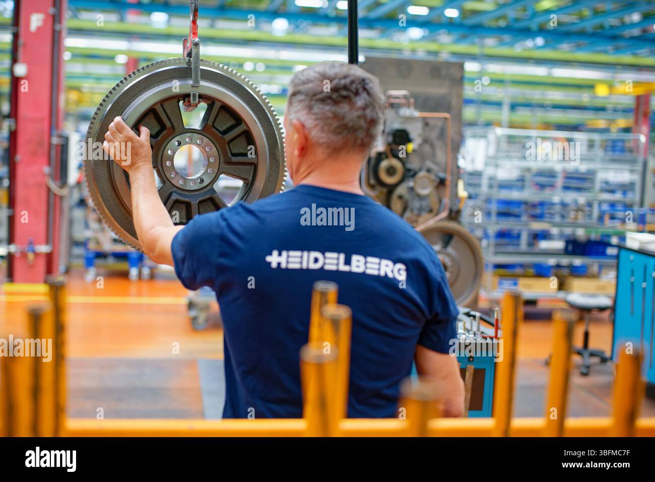 PRODUCTION - 02 June 2025, Baden-Württemberg, Wiesloch: An employee ...