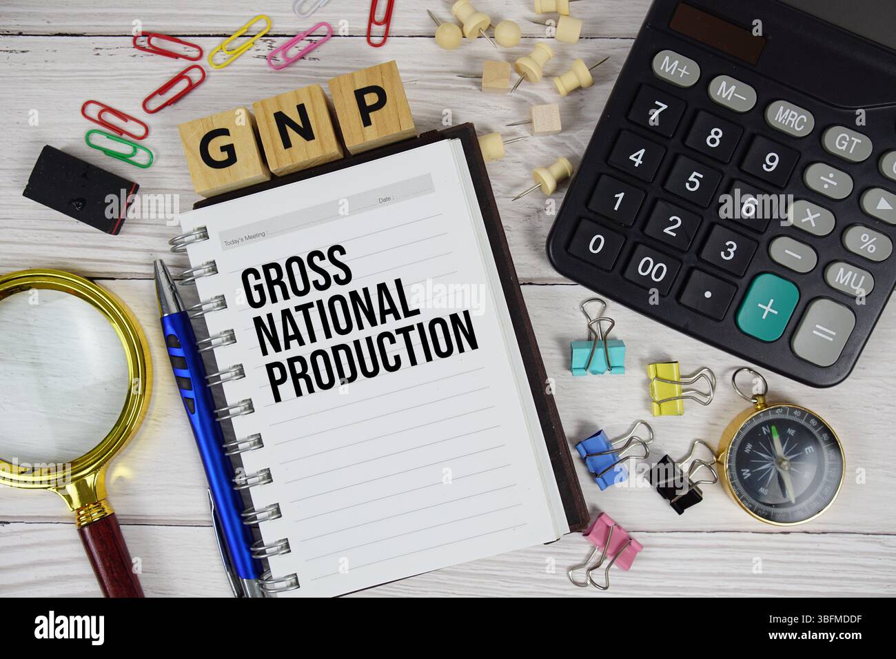 GNP - Gross National Production acronym on notepad, business and ...