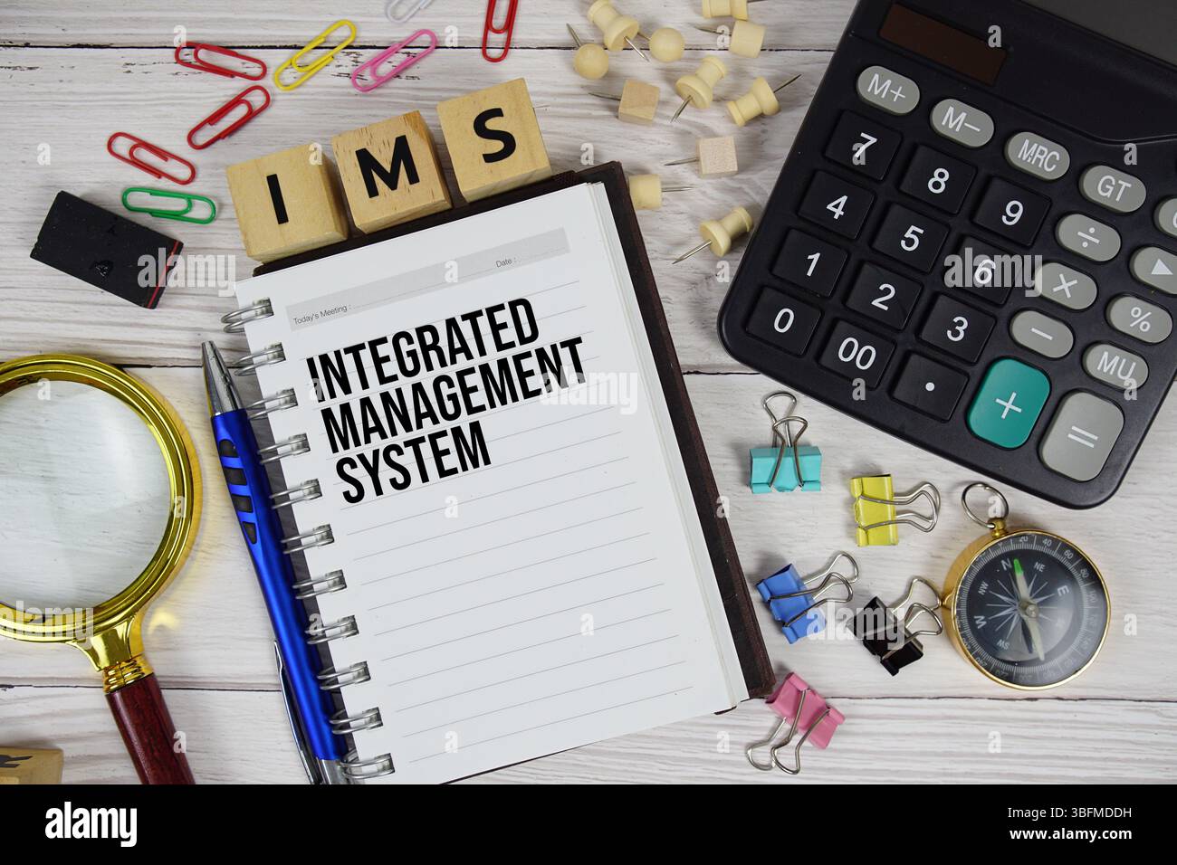 IMS - Integrated Management System acronym on notepad, business and ...