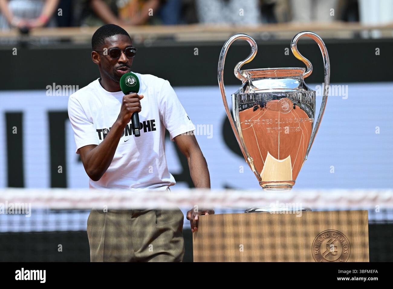 Ousmane Dembele of Paris Saint Germain with the UCL Trophy during ...