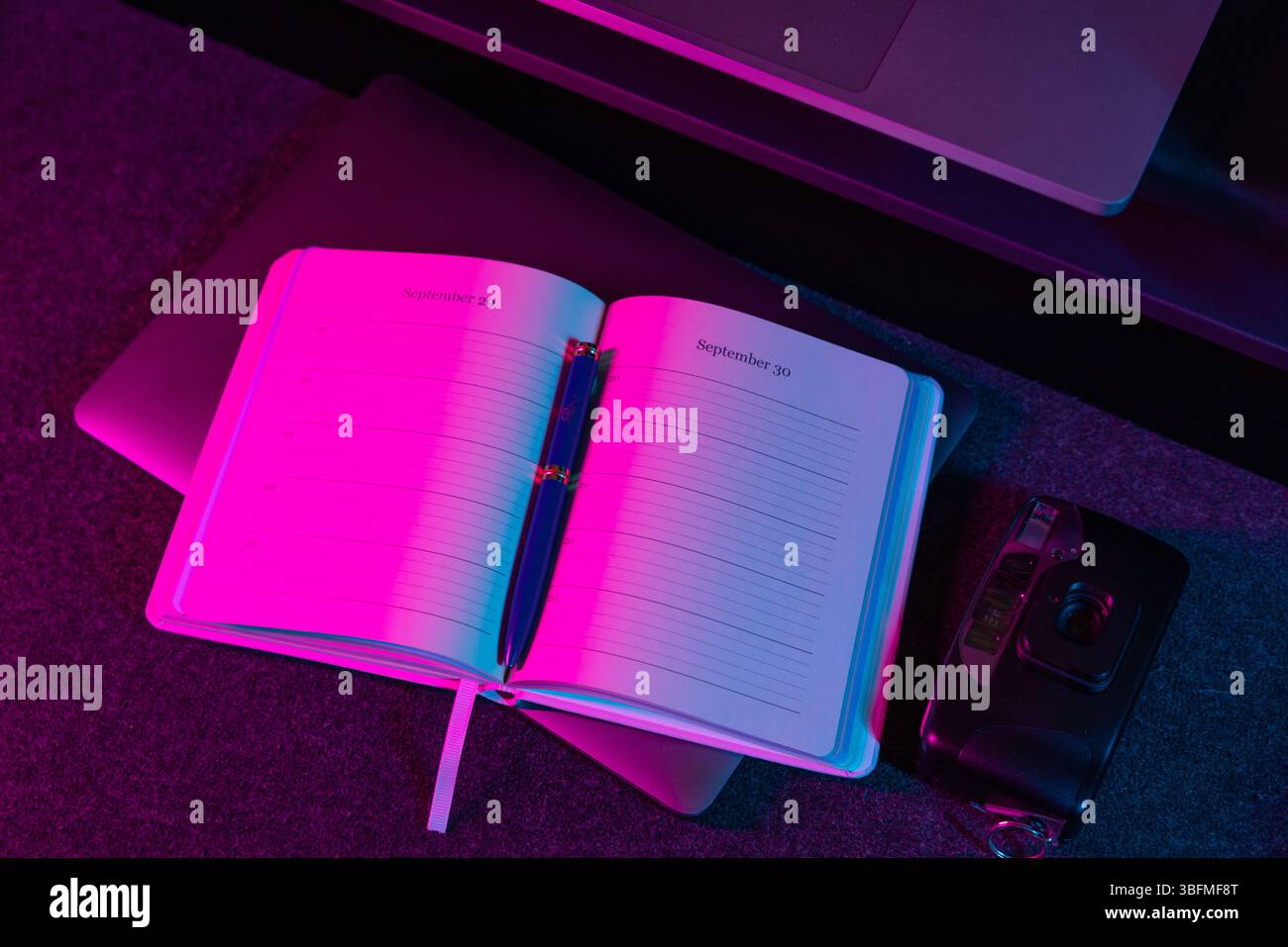 An open planner or diary displaying "September 29" and "September 30 ...