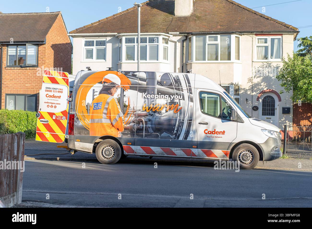 Side view of a Cadent gas van with rear doors open parked on a UK ...