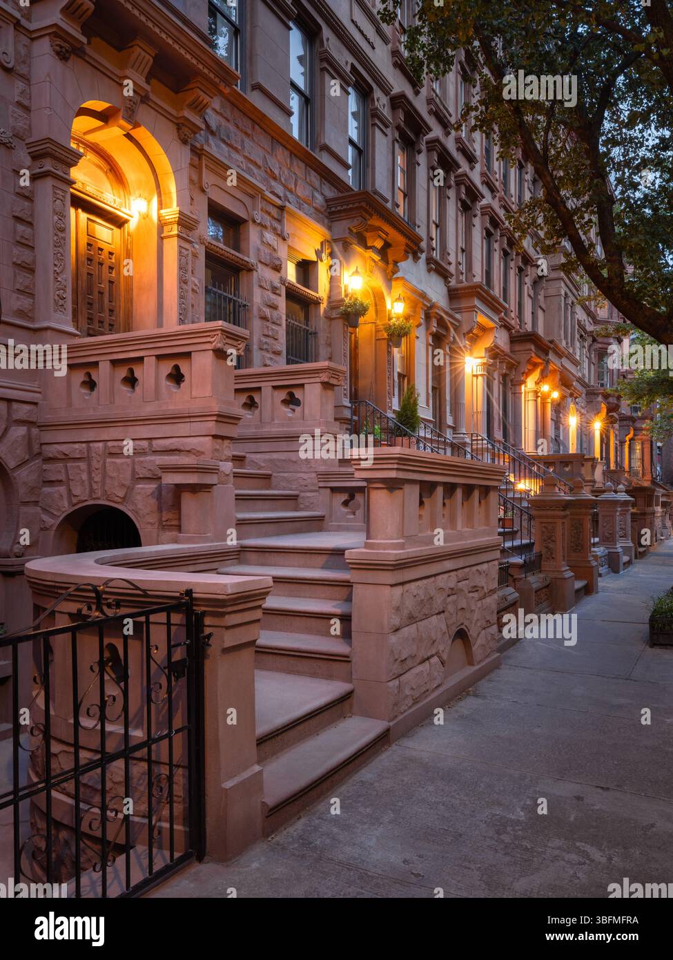 Harlem brownstone facades in Mount Morris Historic District at twilight ...