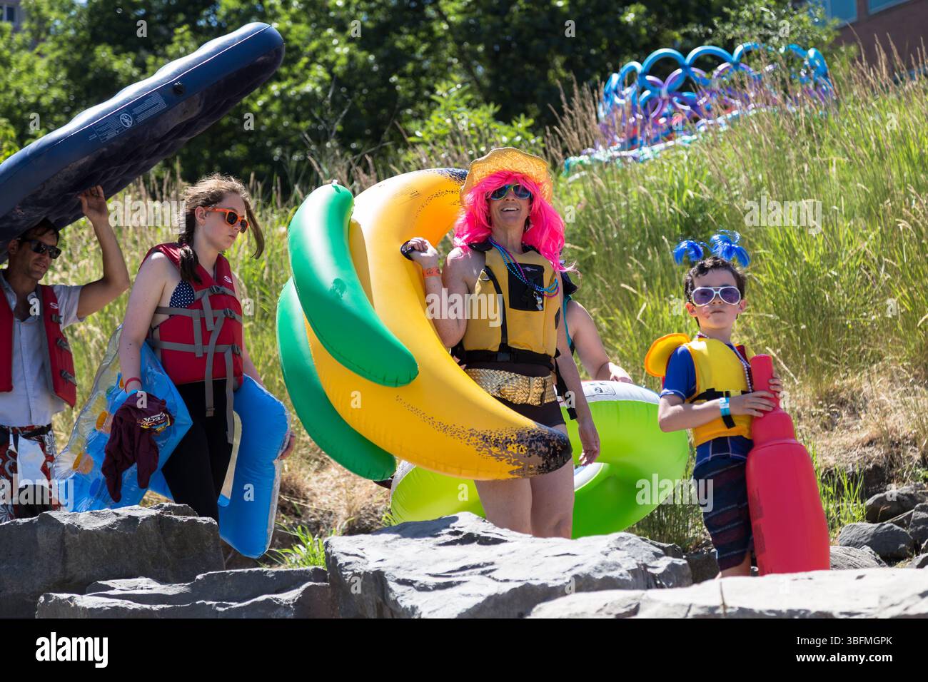 The Big Float, Portland, Oregon - July 15th 2017: People carry ...
