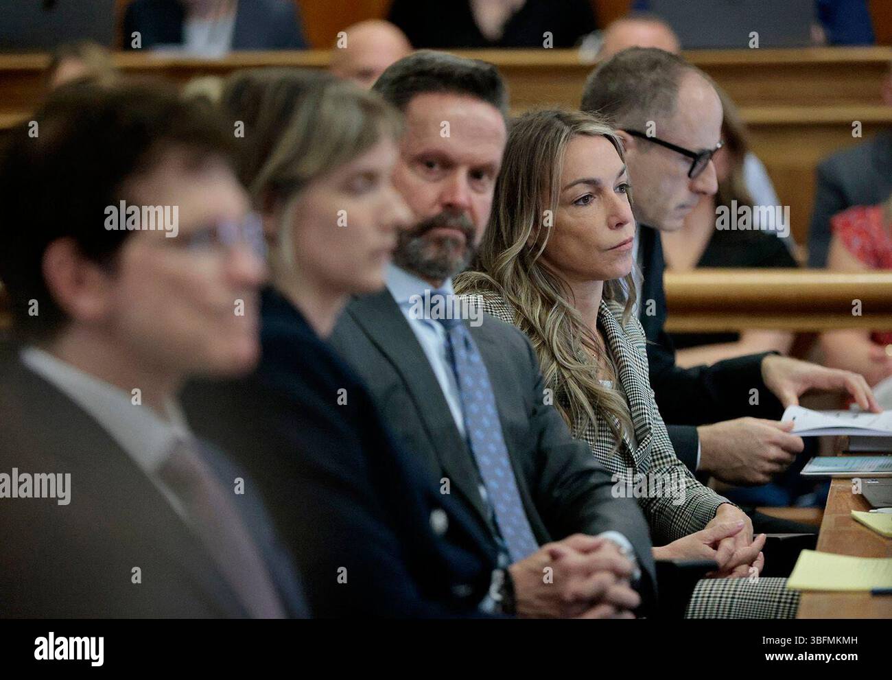 Karen Read sits with her defense team, from left, Robert Alessi ...