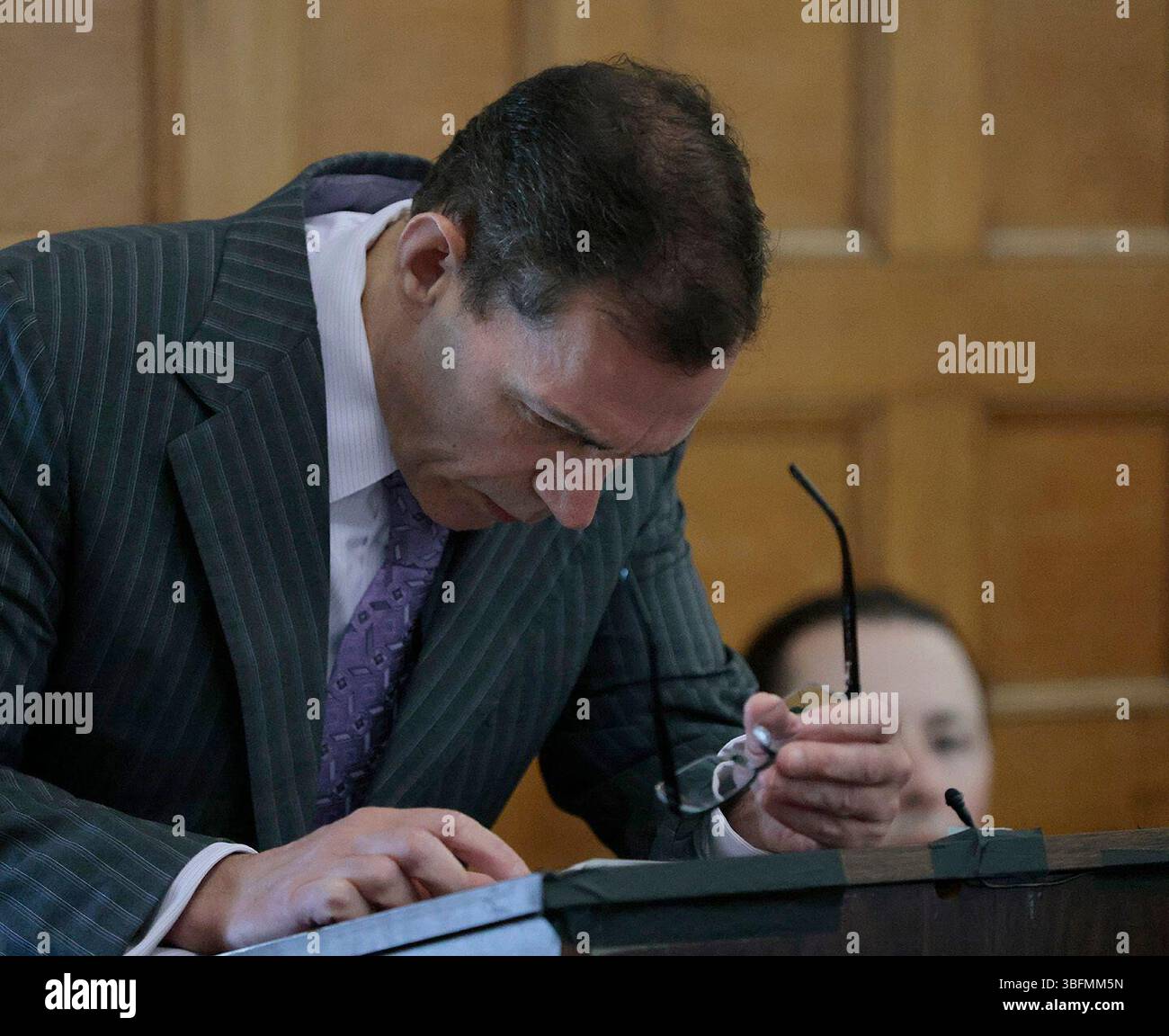Special prosecutor Hank Brennan reads comments out loud during the ...