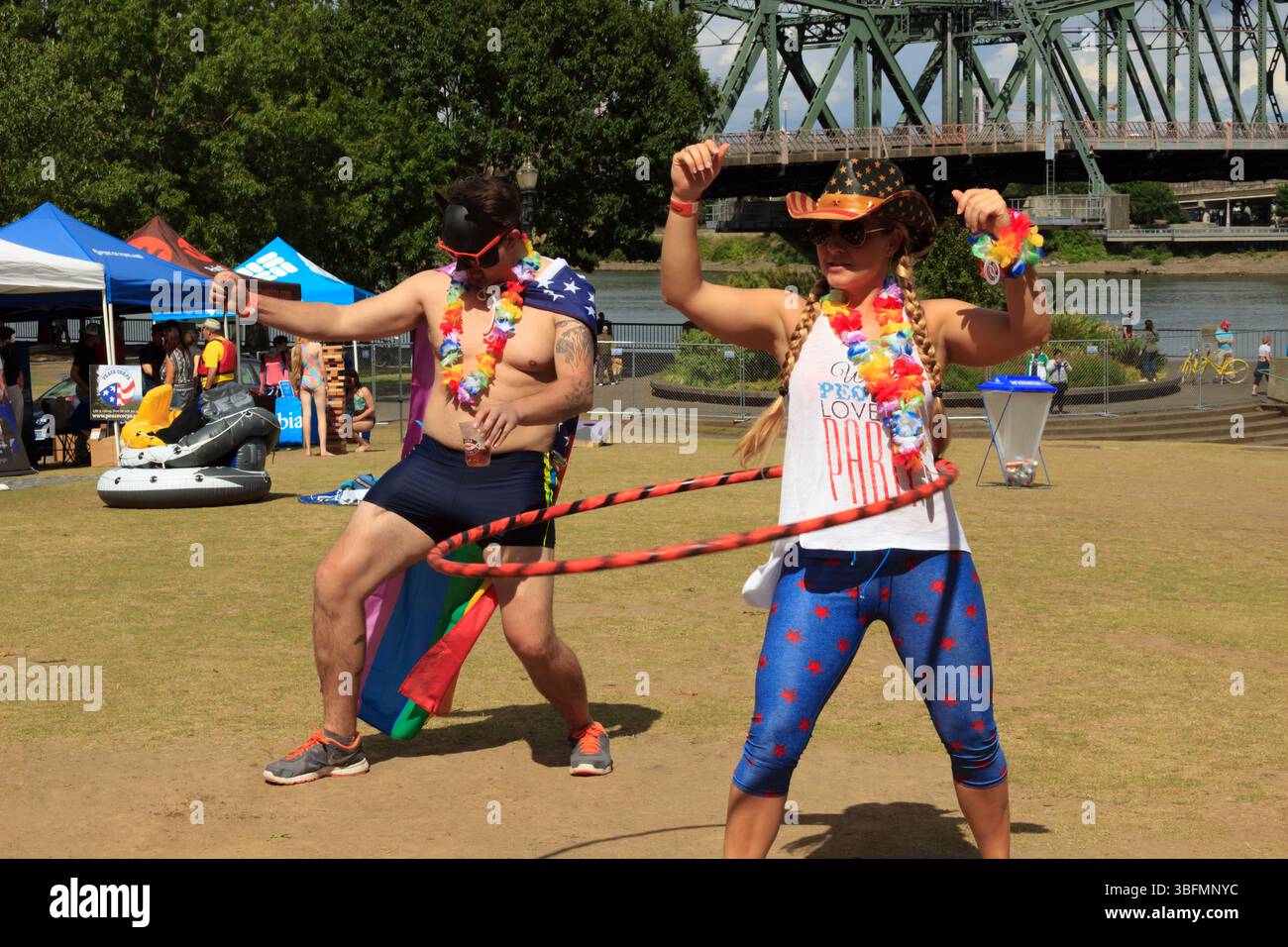 The Big Float, Portland, Oregon - July 10th 2016: Two people dance with ...