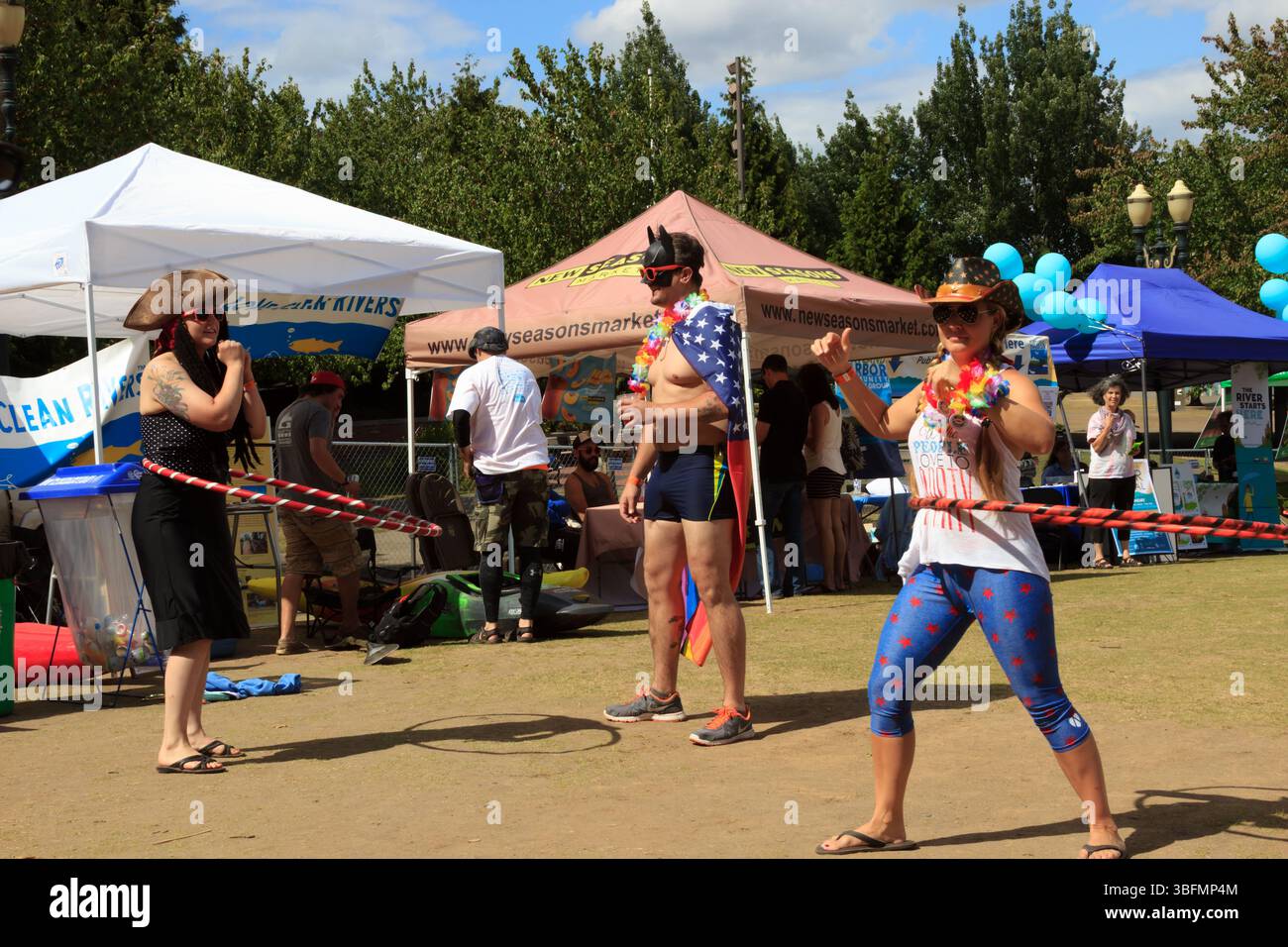 The Big Float, Portland, Oregon - July 10th 2016: People hula hooping ...