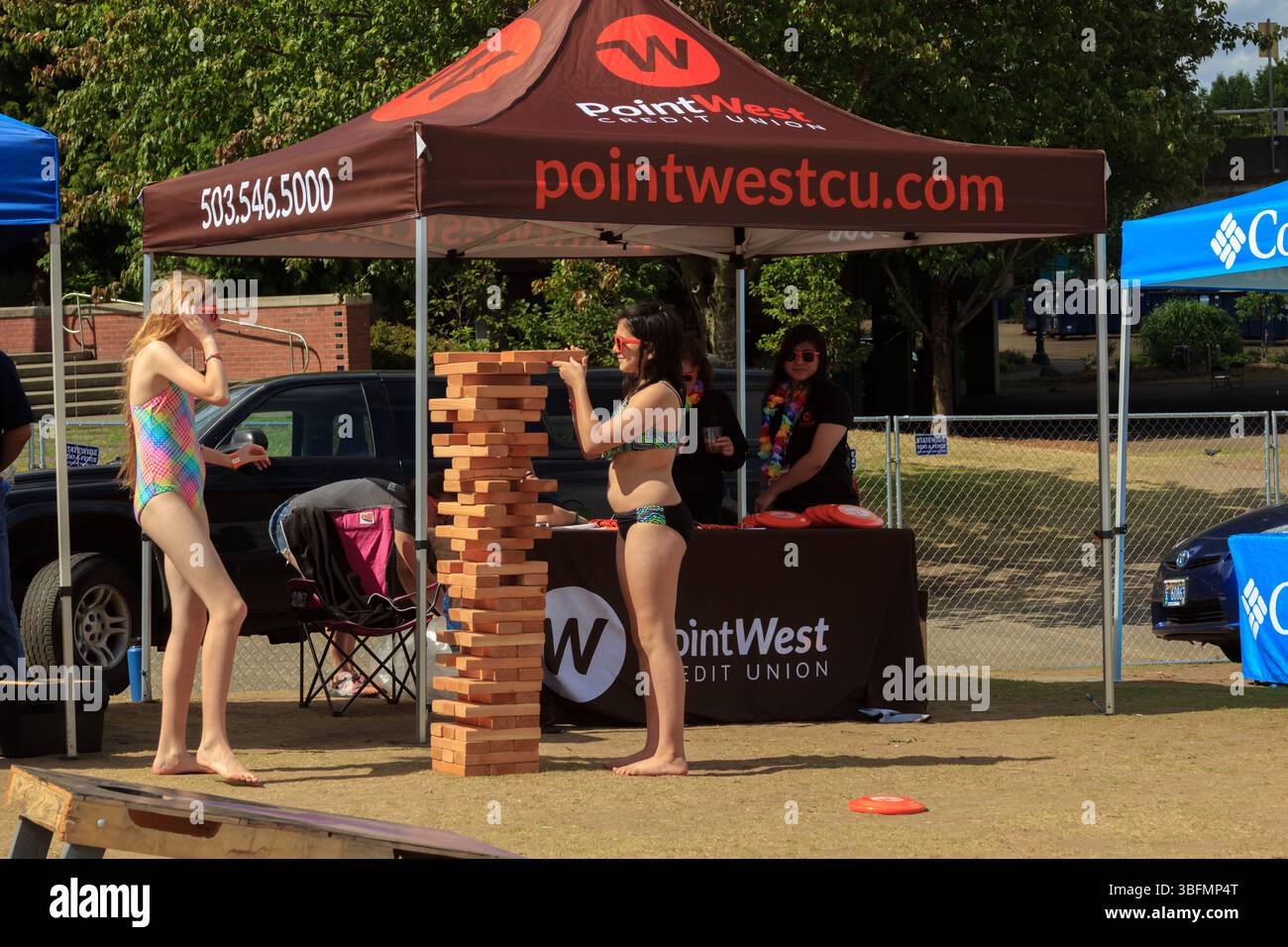 The Big Float, Portland, Oregon - July 10th 2016: Two girls play a ...