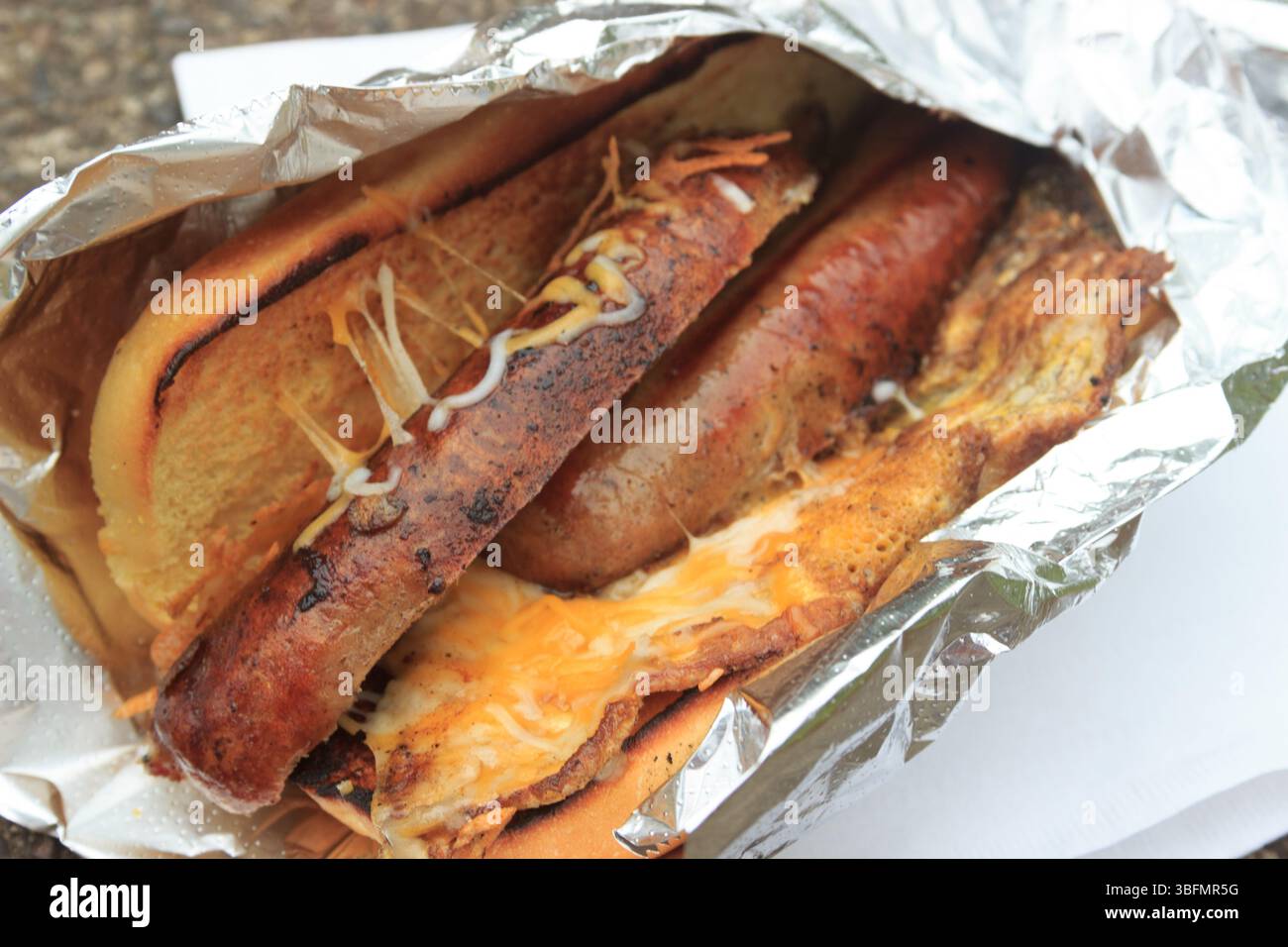 The Big Float, Portland, Oregon - July 10th 2016: A hotdog with cheese ...