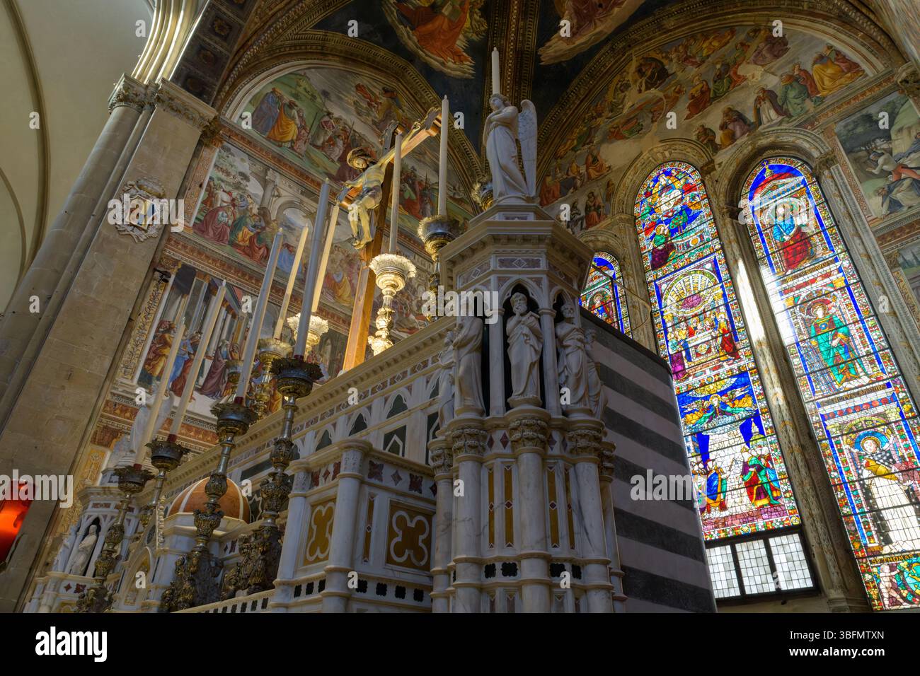 High altar and stained glass of Santa Maria Novella, Florence. Gilded ...