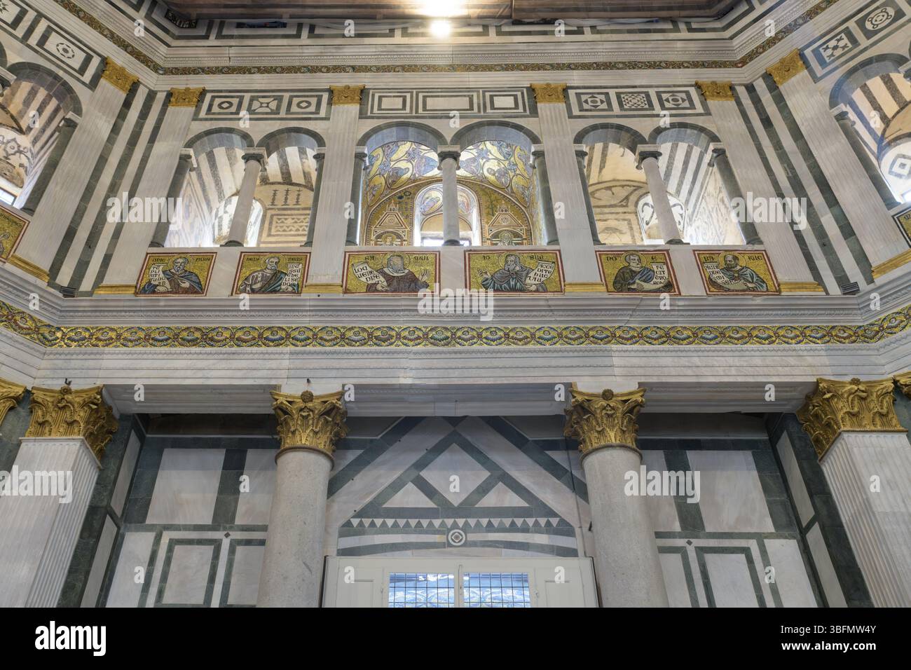 Interior gallery of the Florence Baptistery with Romanesque columns and ...